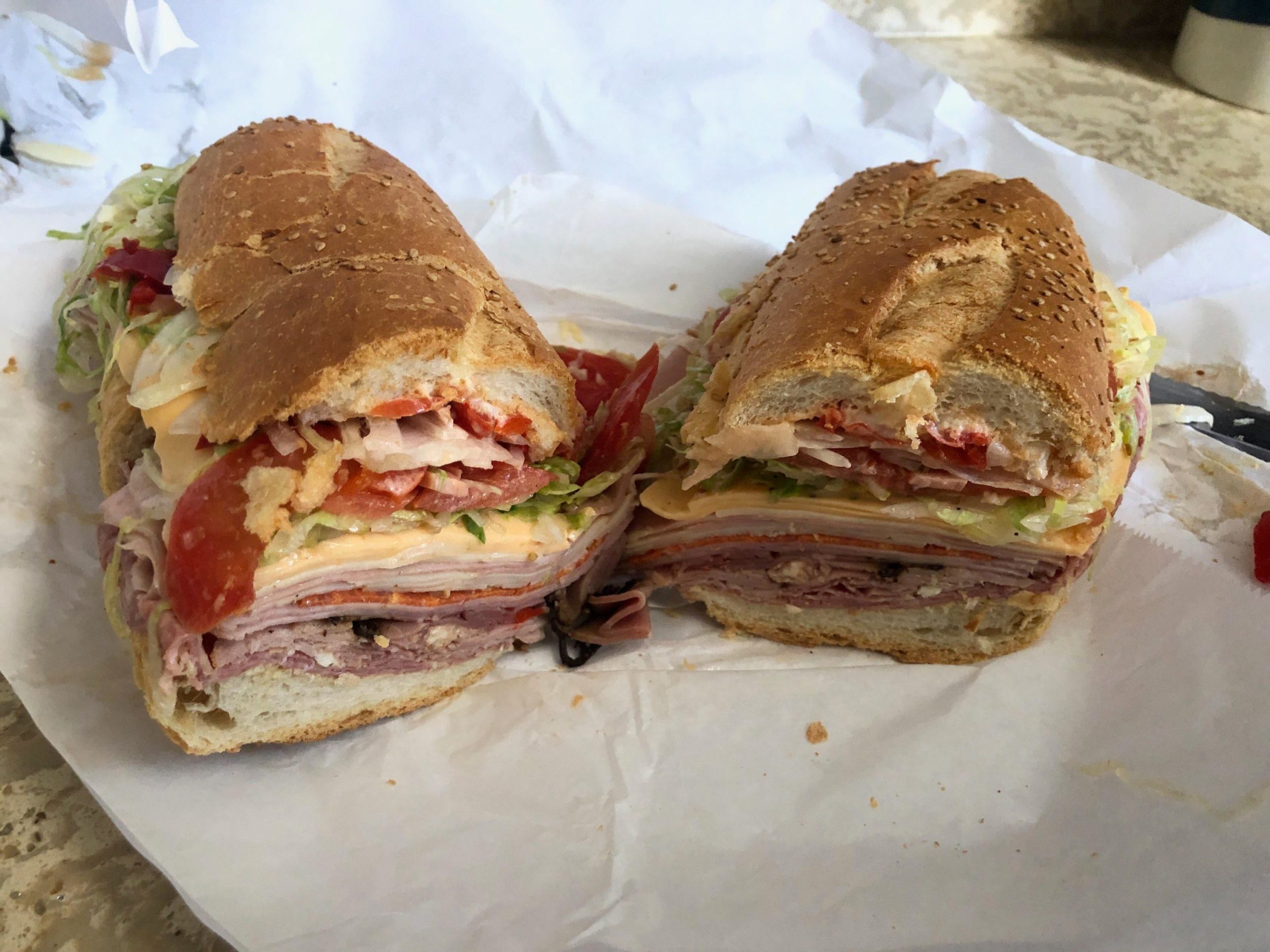 Triple stacker turkey, bacon, avocado, tomato, and spring mix with mayo ...
