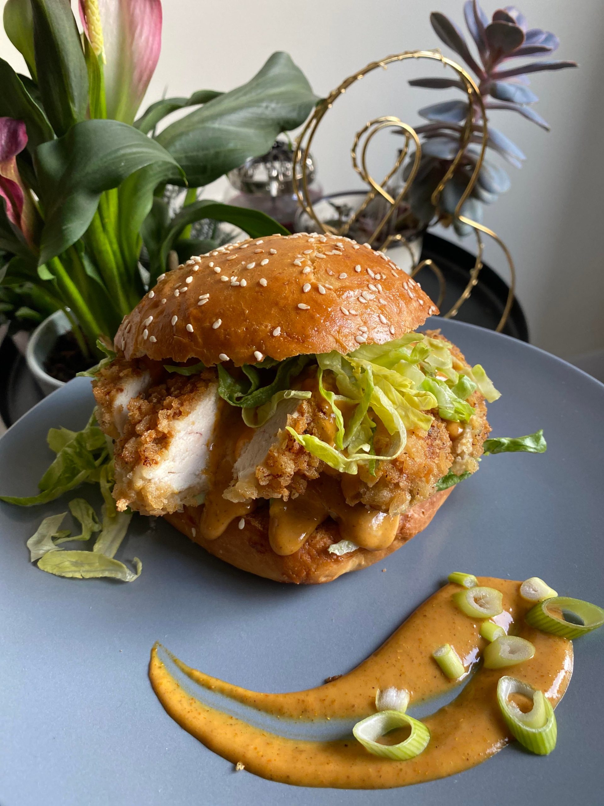 Japanese-spiced fried chicken with spicy katsu mayonnaise on a homemade ...