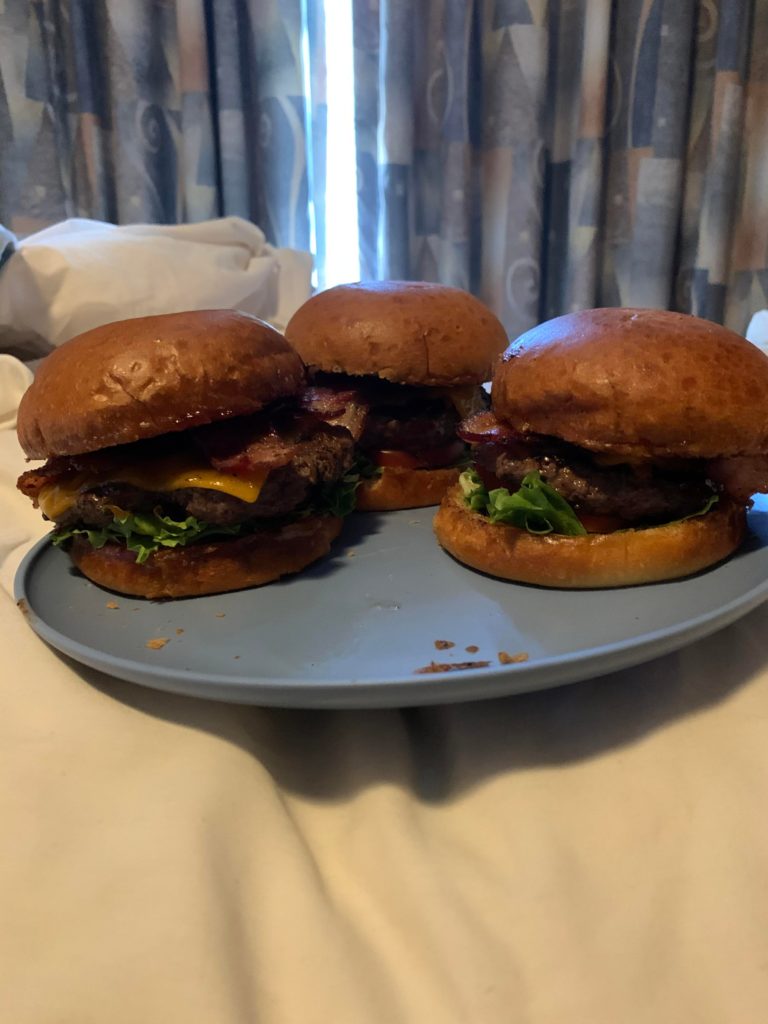 Some beef on brioche with cheddar and bacon. The one on the left is my ...