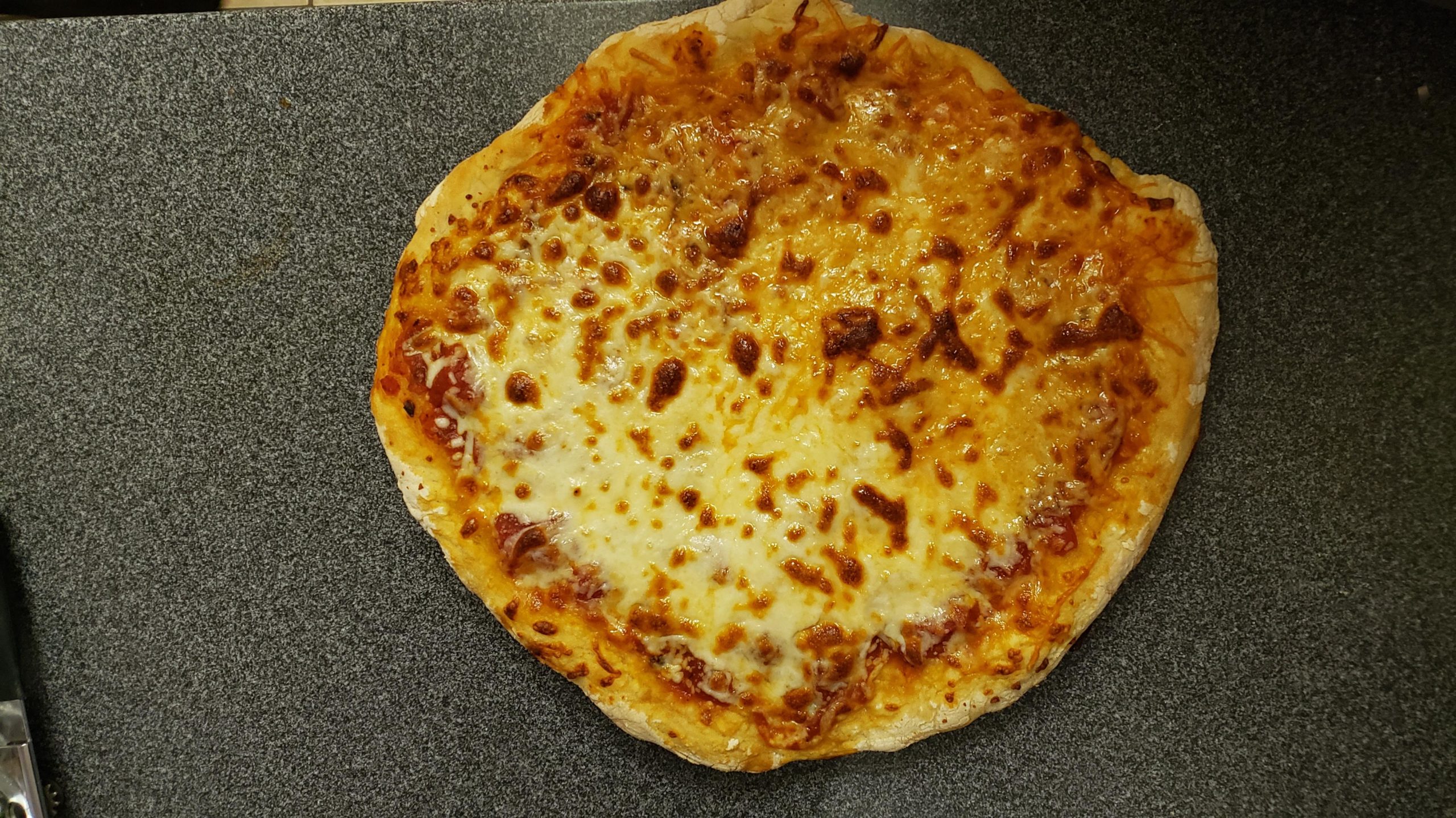 First Pizza Ever - It's almost round! - Dining and Cooking