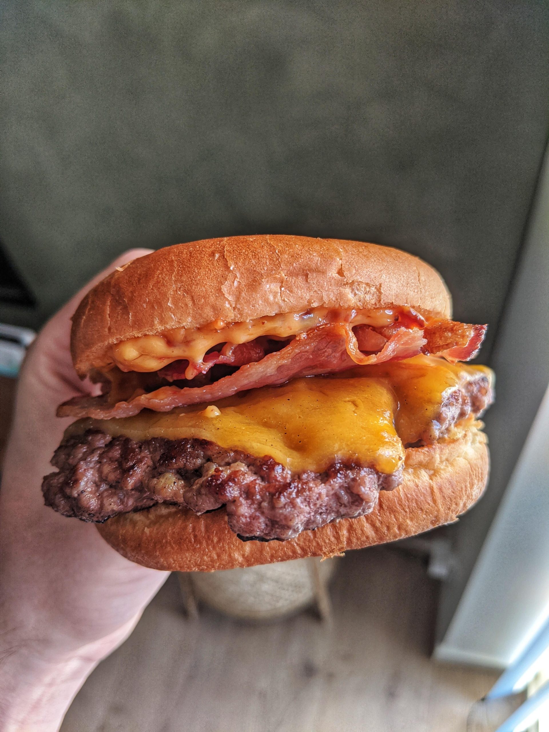 Smashburger, cheddar, bacon, chorizo mayo, on brioche. - Dining and Cooking