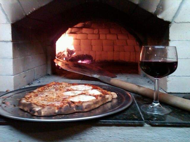 Here's the pizza oven my dad built in our basement - Dining and Cooking