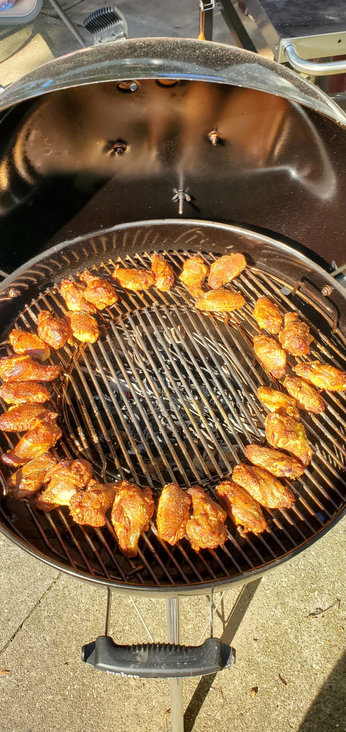 Smoked wings! Finished half with Sweet Baby Ray's and half with Kinders ...
