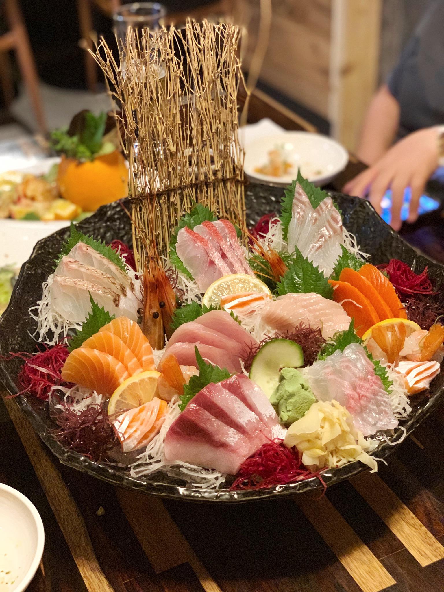 I miss going out for sushi and seeing this beautiful sashimi platter ...