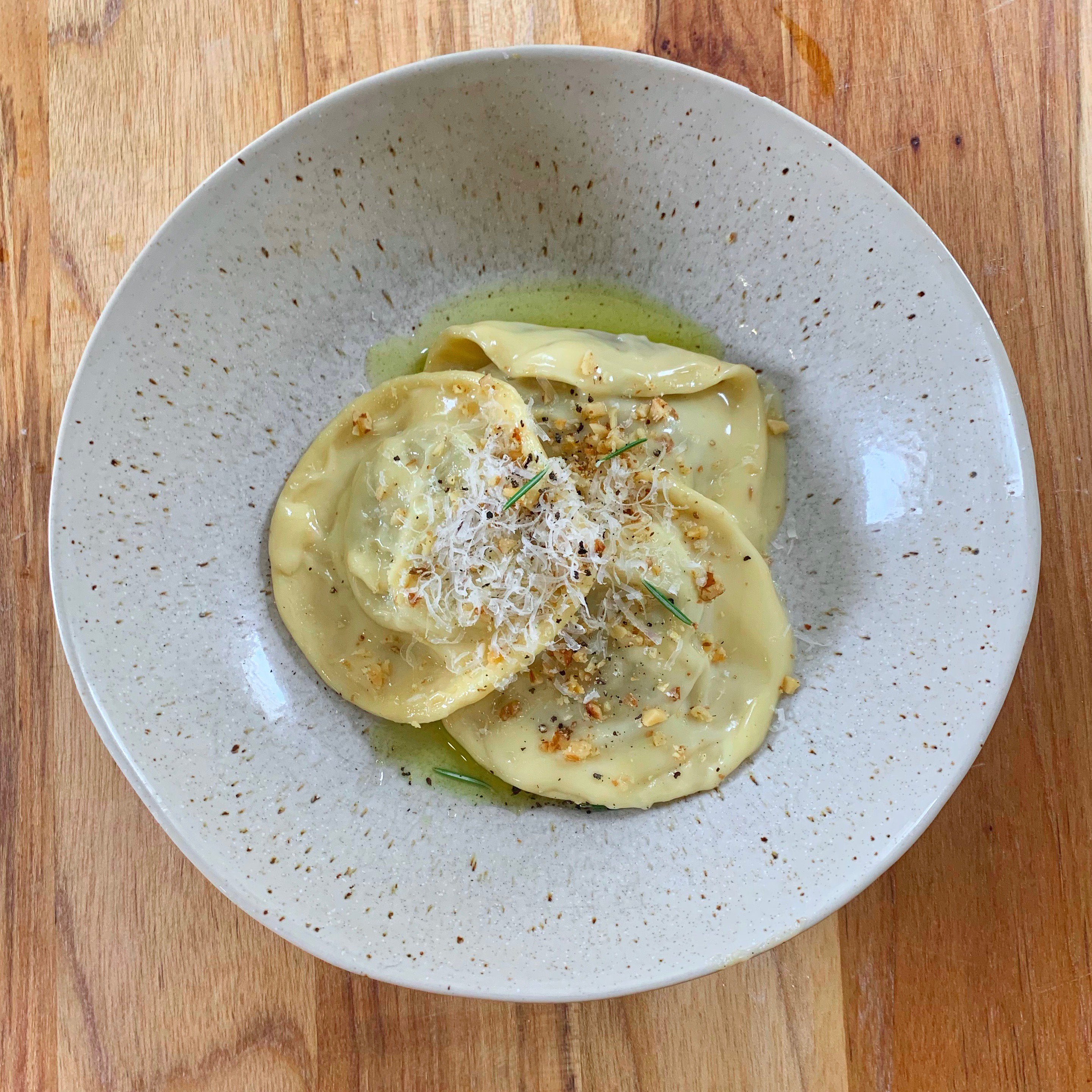 Hen of the wood mushroom, ricotta, and toasted walnut ravioli with ...