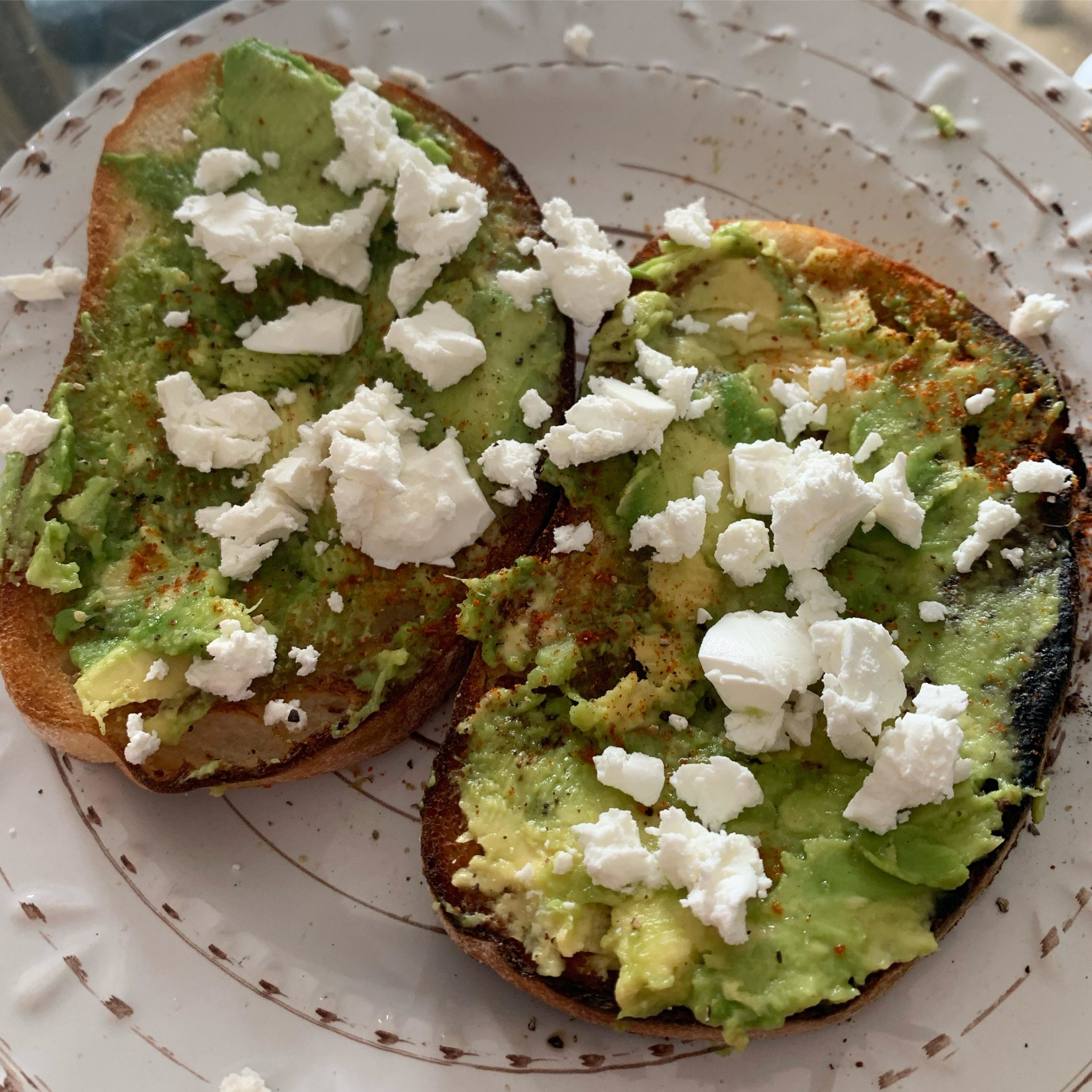 My go to breakfast - avo on sourdough with lemon juice and danish feta ...