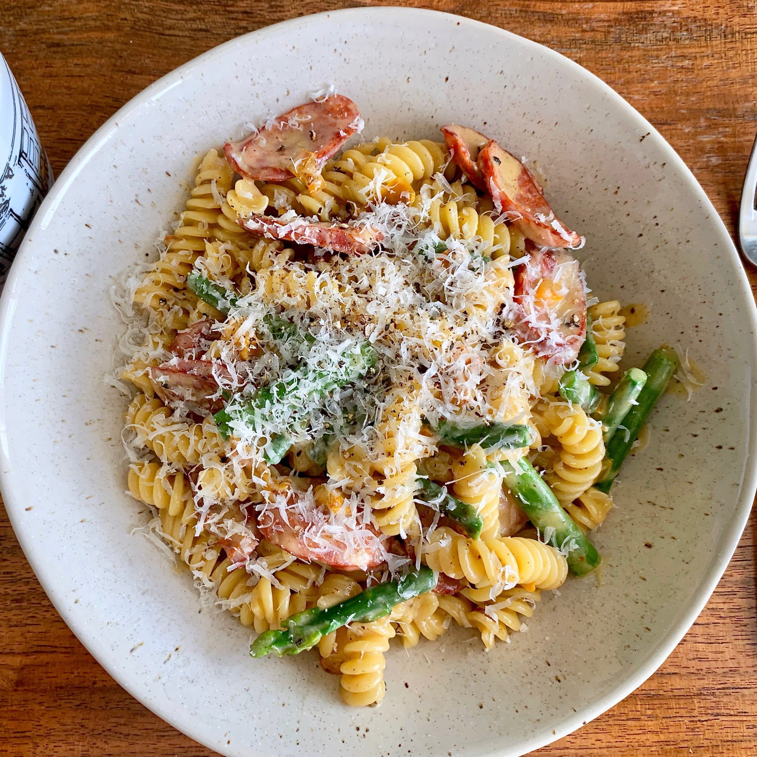 Carbonara style fusilli with peppers, spicy sausage, and asparagus ...
