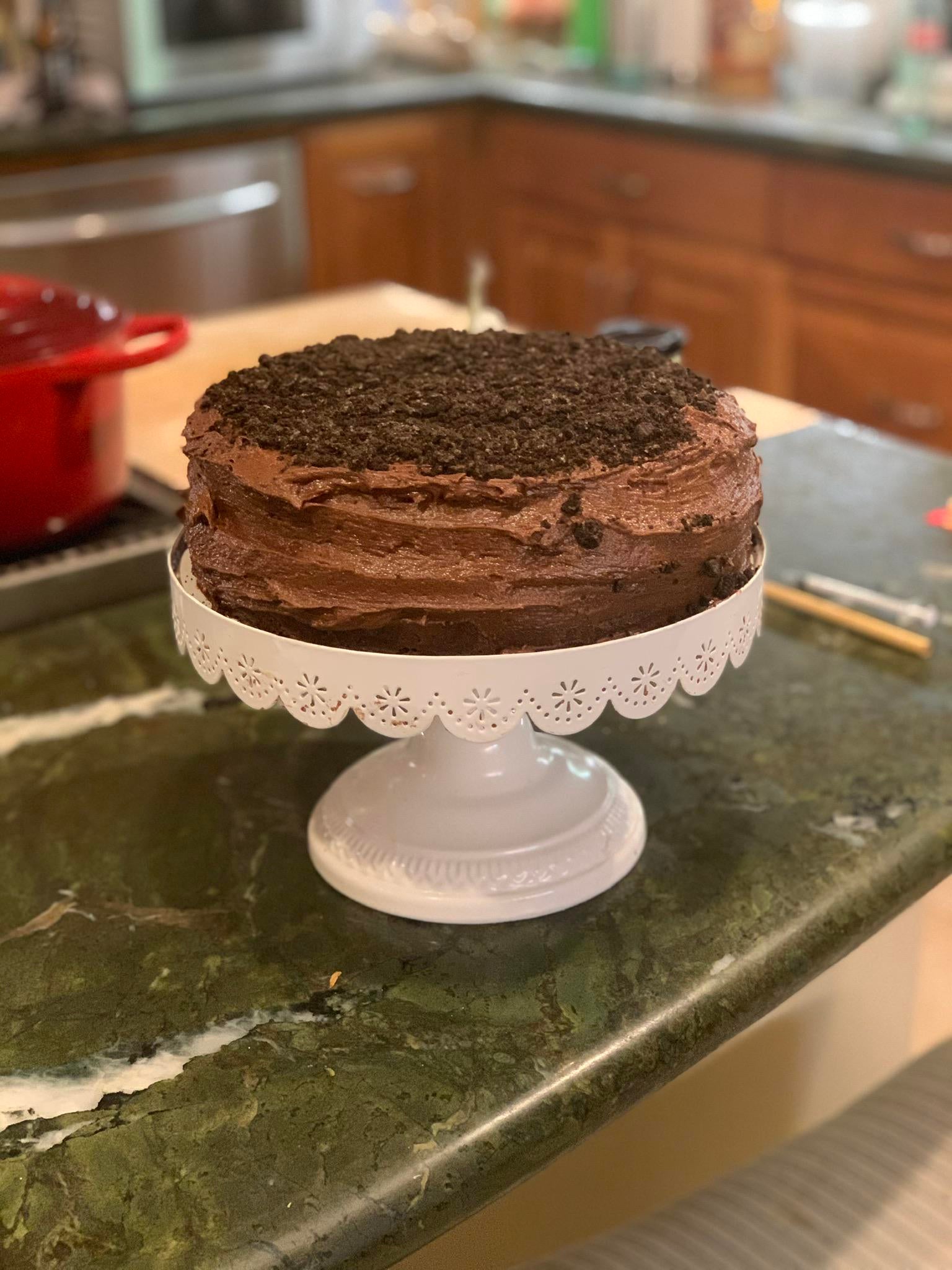 Oreo stuffed cake with a vanilla center and a chocolate buttercream ...