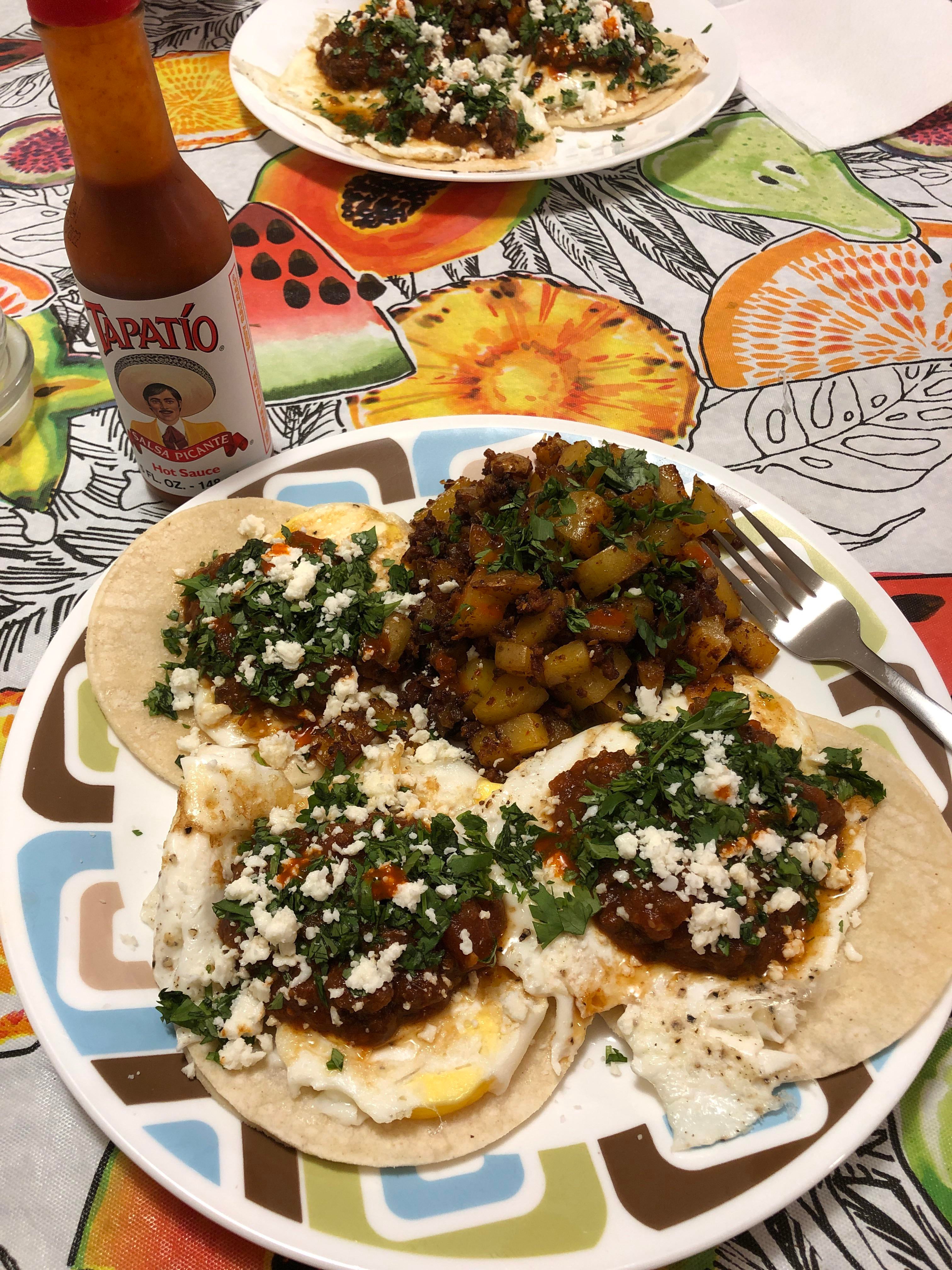 I made Huevos Rancheros with potatoes and pork chorizo for dinner ...