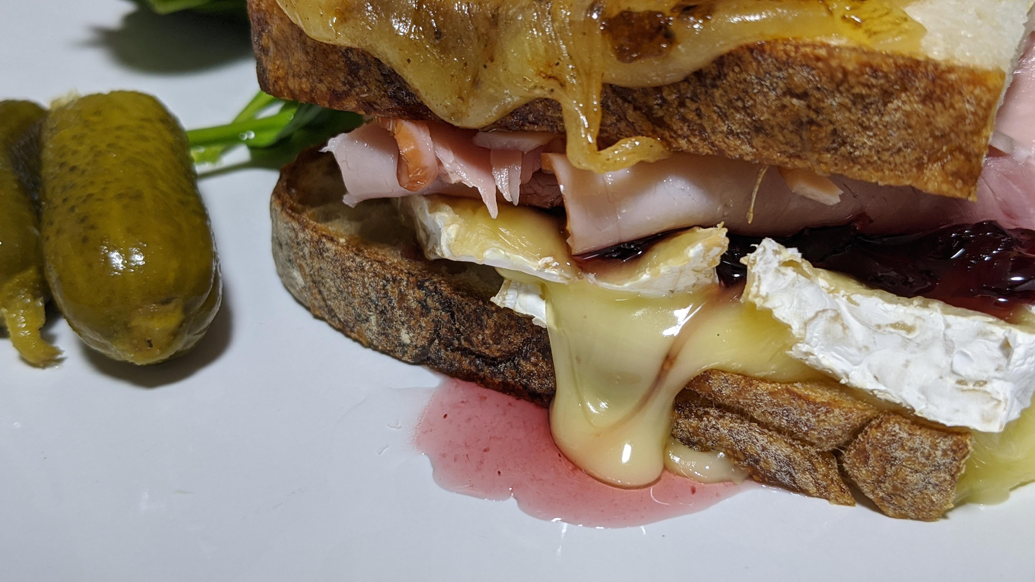 Brie, truffle ham, cranberry sauce on sourdough topped with cheddar ...
