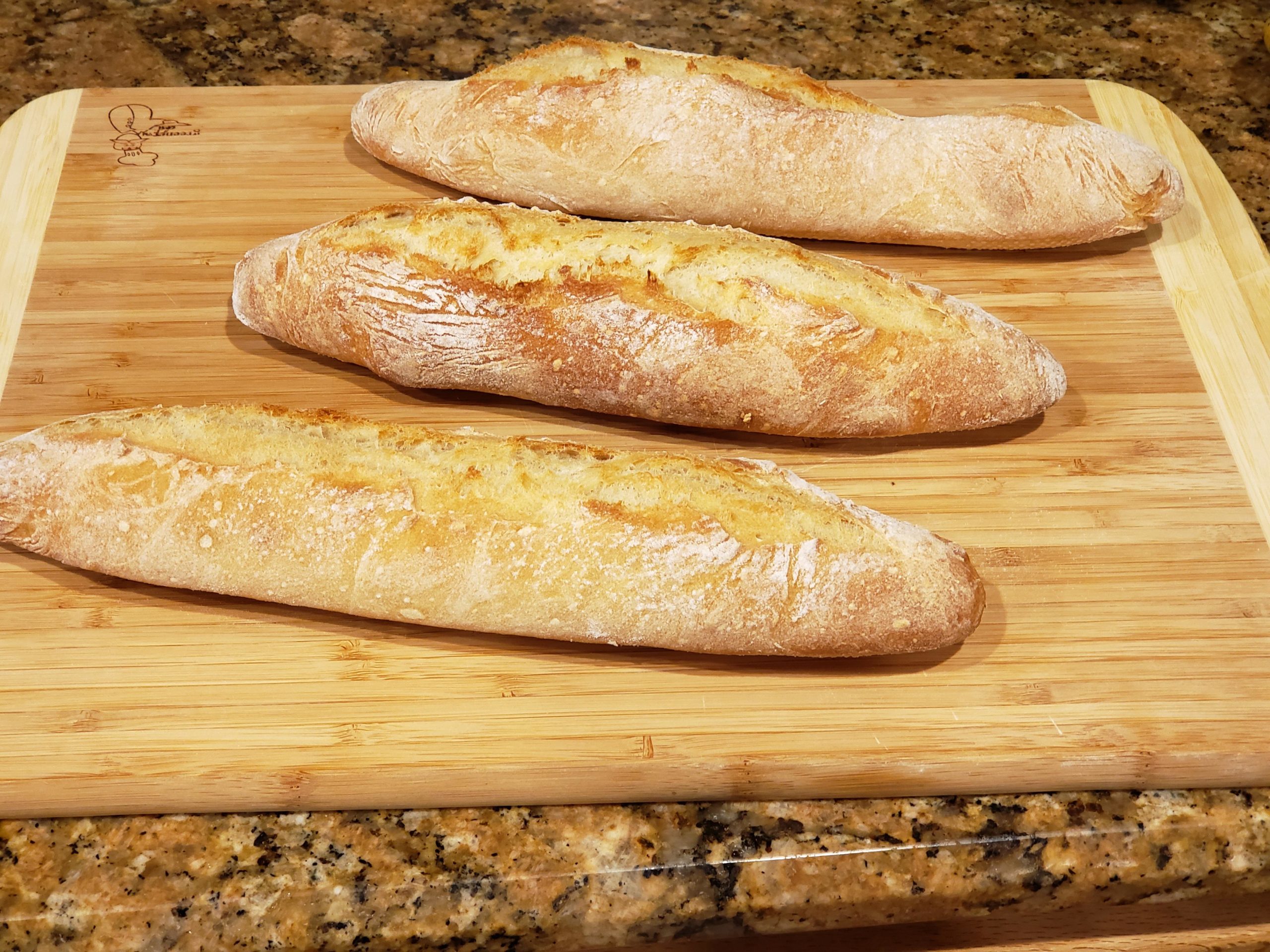 First time baguettes. Cold water and time develops amazing flavor ...
