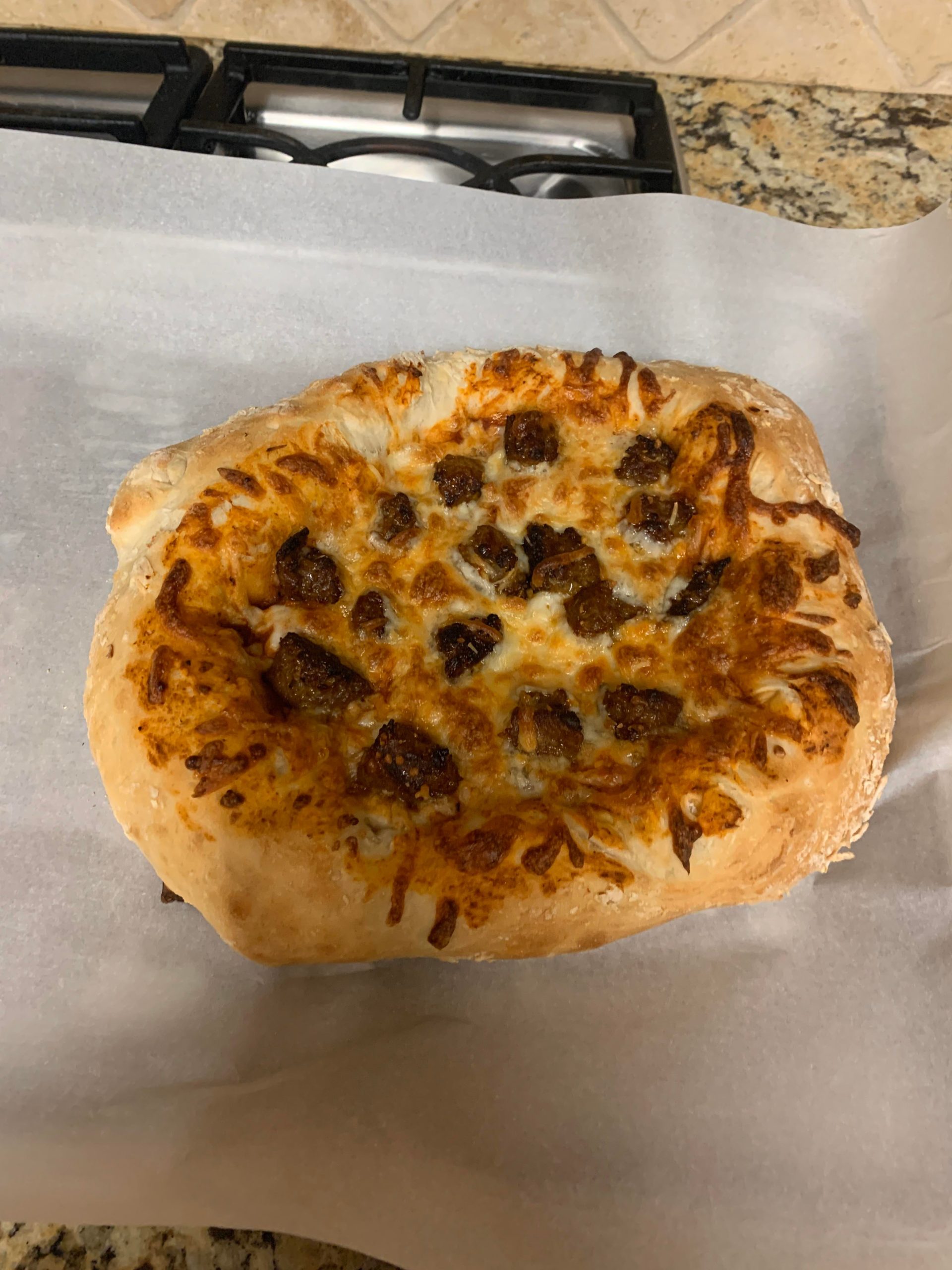 Big crust pizza with some Italian sausage - Dining and Cooking