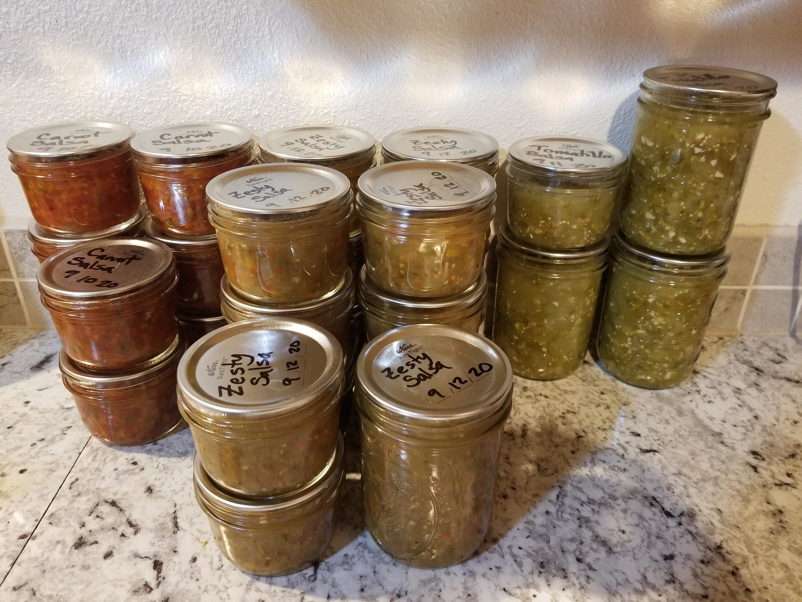 My first go at canning! 7 half pints of peach jam. They all seem to ...