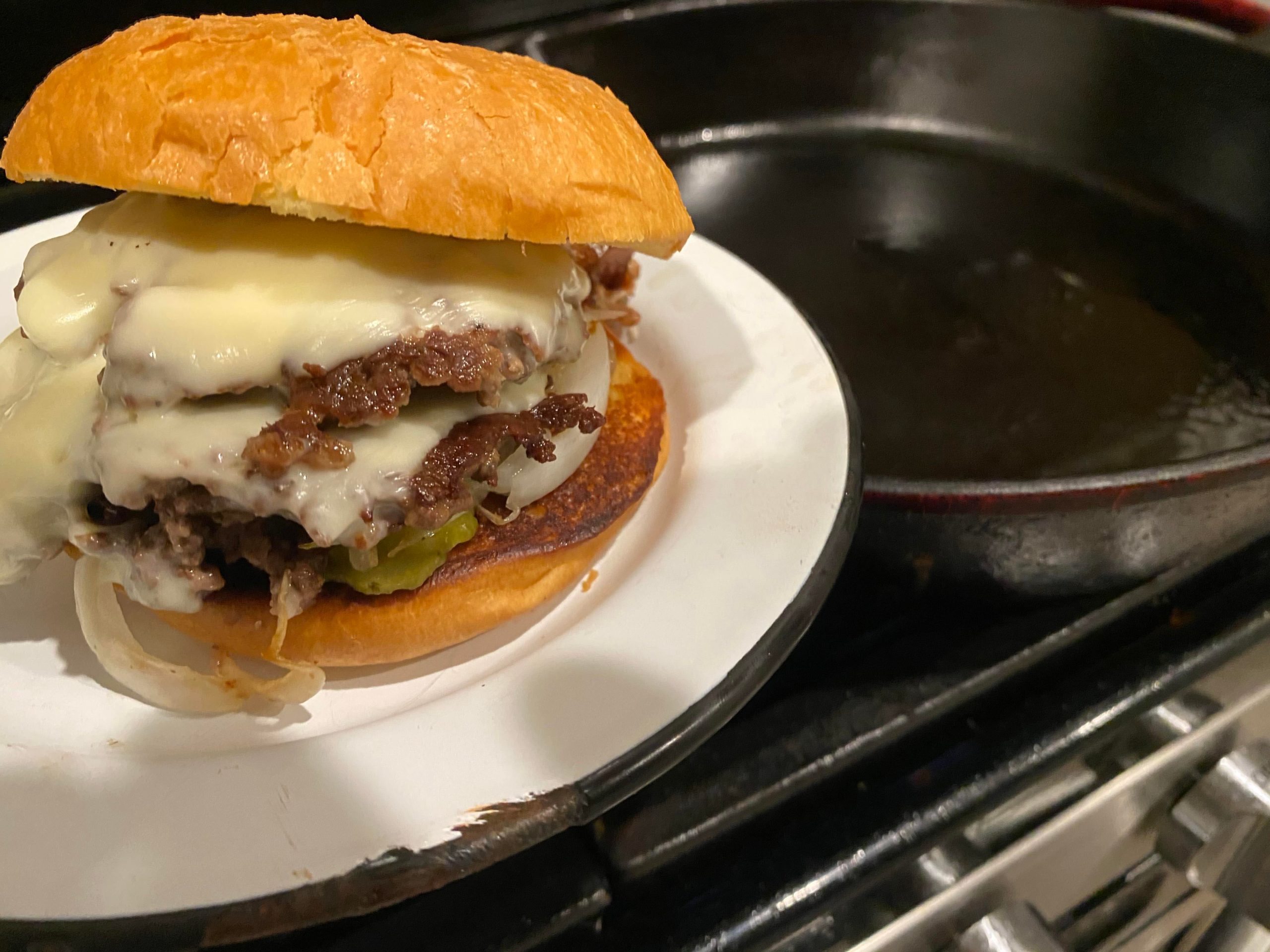 Smash burgers, sautéed onions, toasted brioche buns (w/pickles) all ...