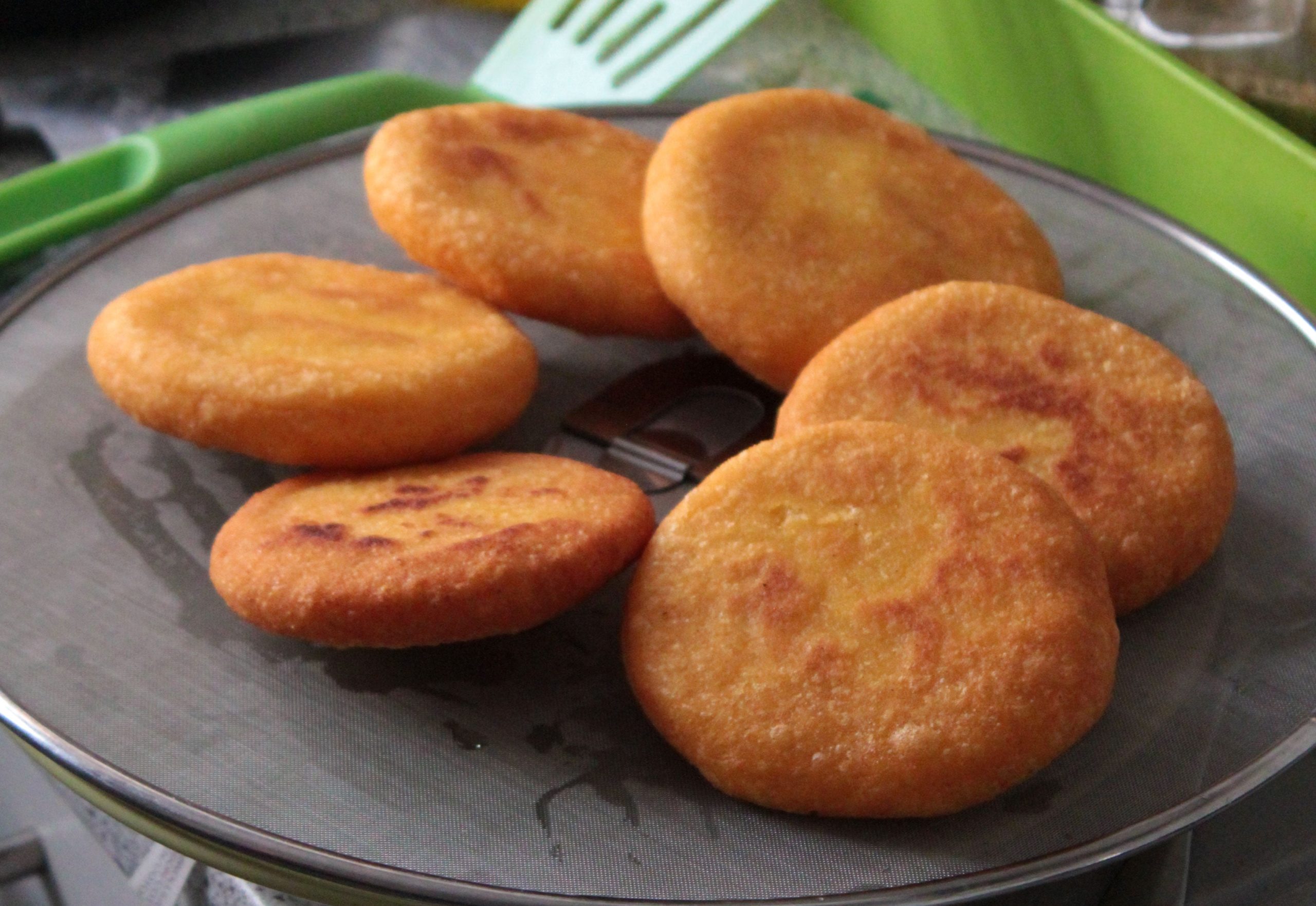 Some Venezuelan yellow corn arepas, crunchy outside, soft and tasty ...