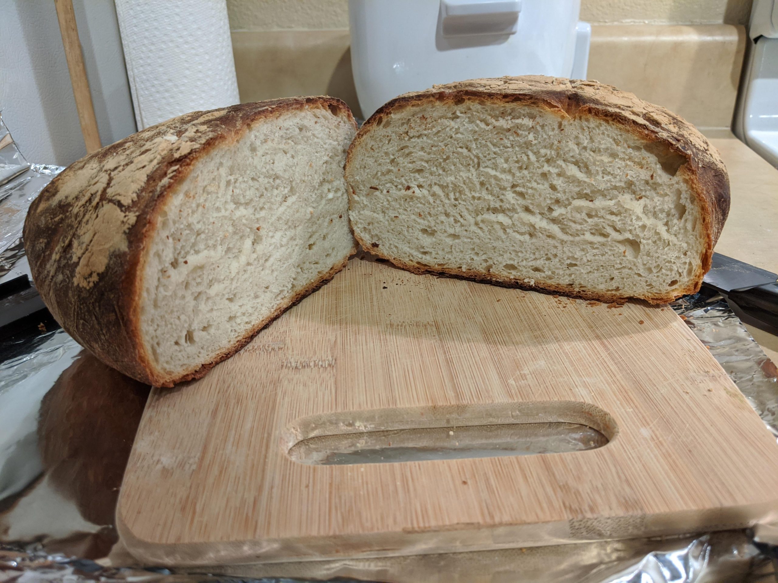 A basic white bread. A little too dense, but excellent hydration and ...