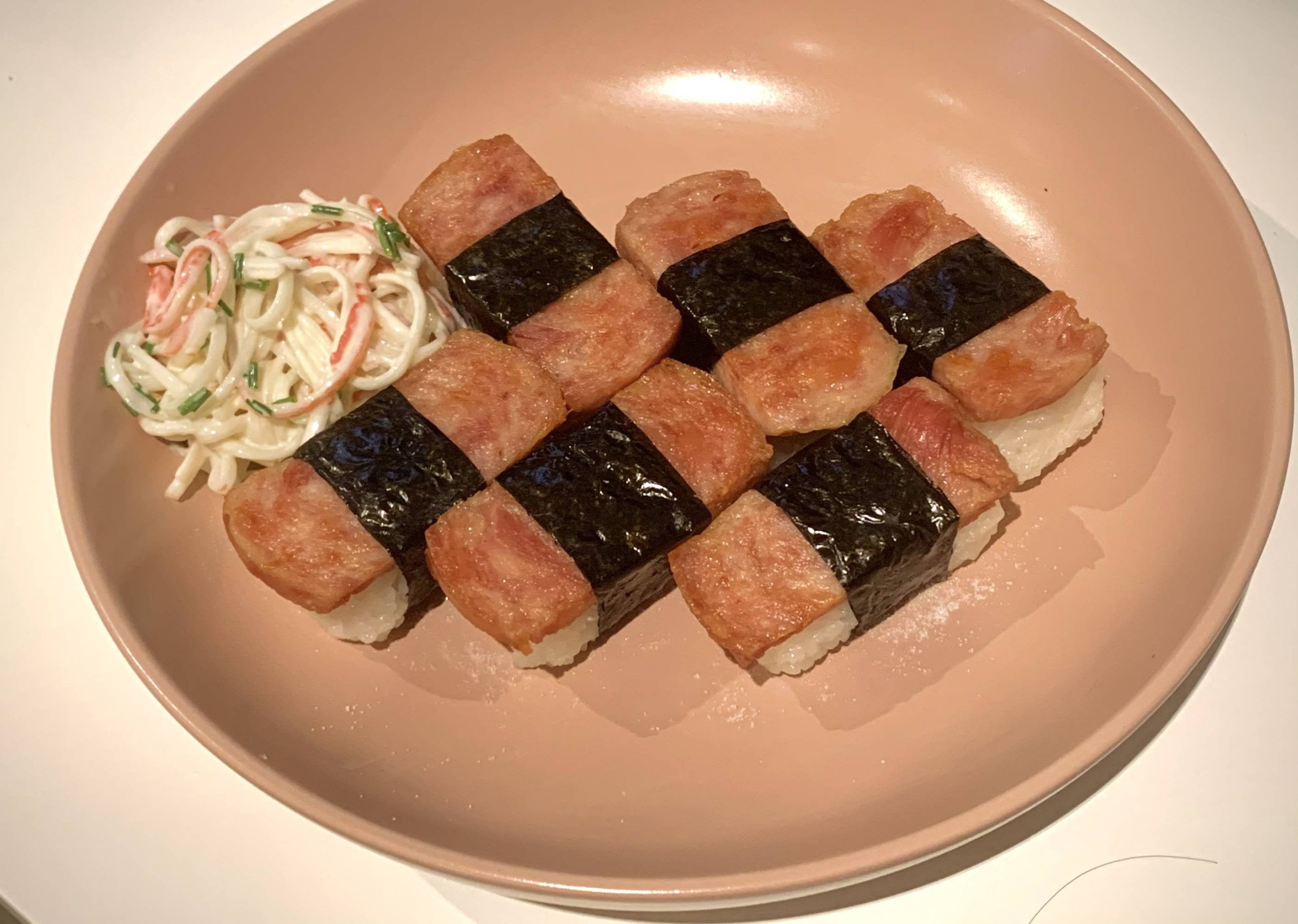 Homemade Musubi, nigiri and maki with edamame and seafood wasabi salad ...