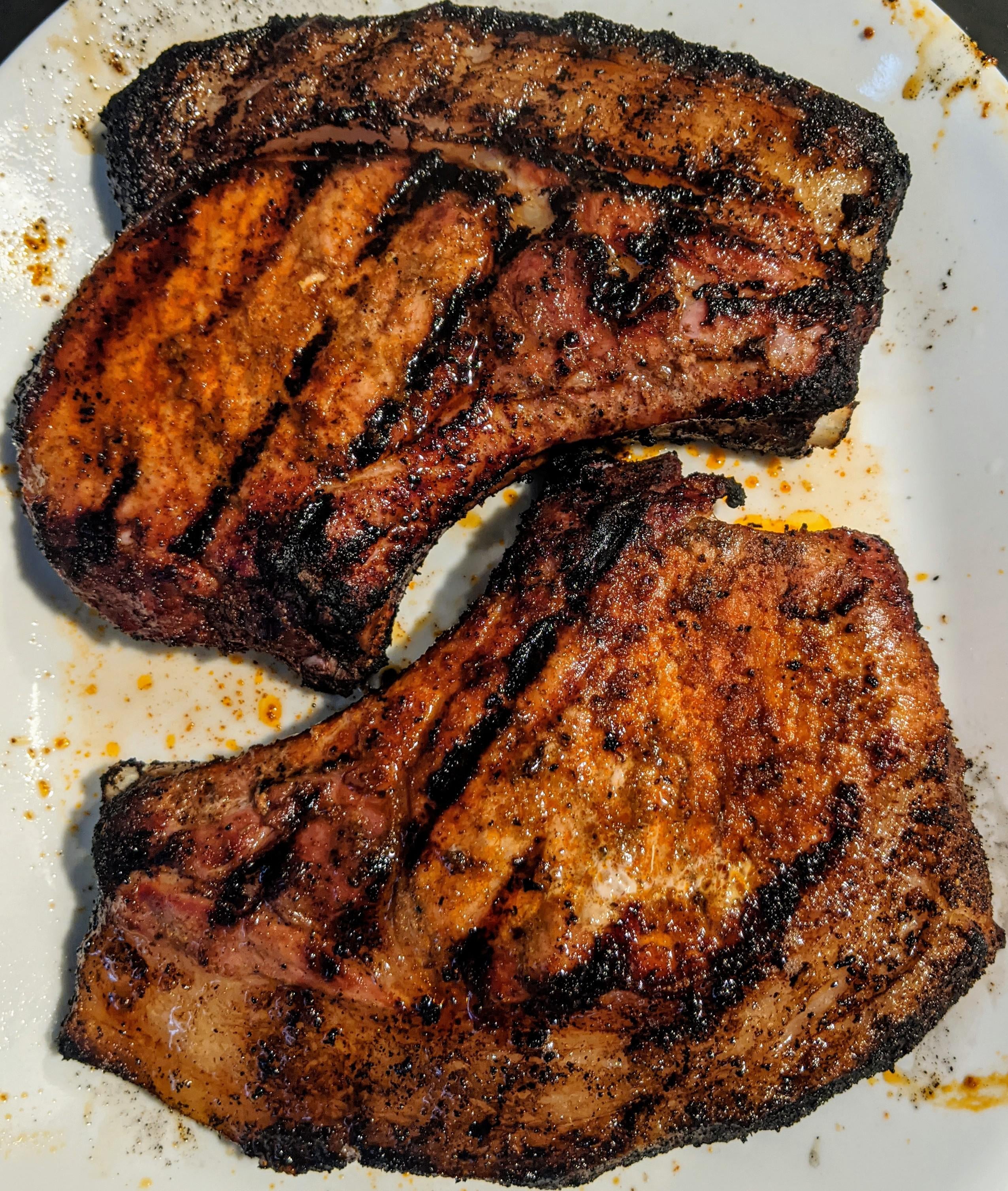 Reverse seared bone in pork chops off the BGE. Took them to 140 ...