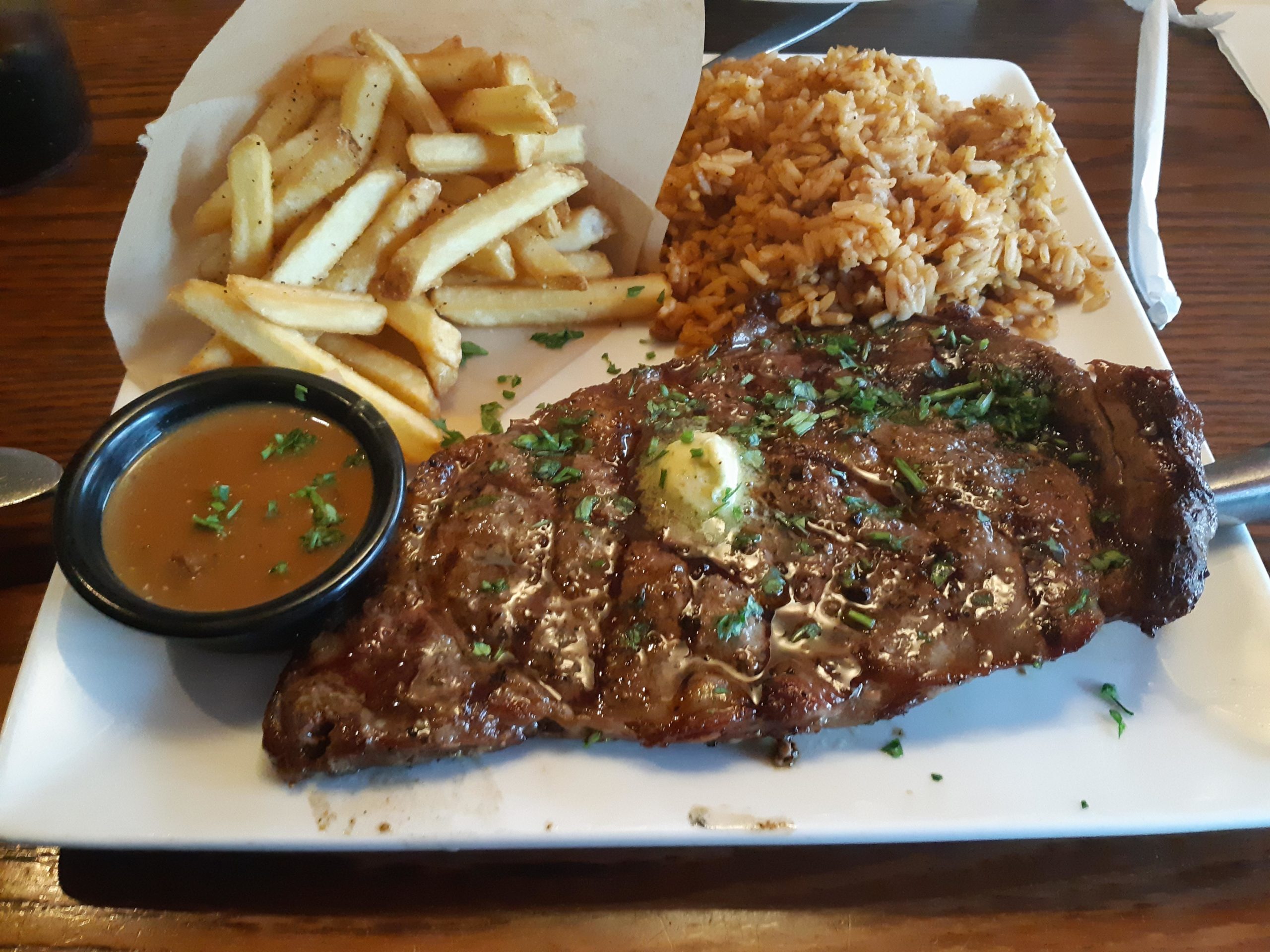Ribeye Steak with some Fries and Java Rice trust me its good af ...