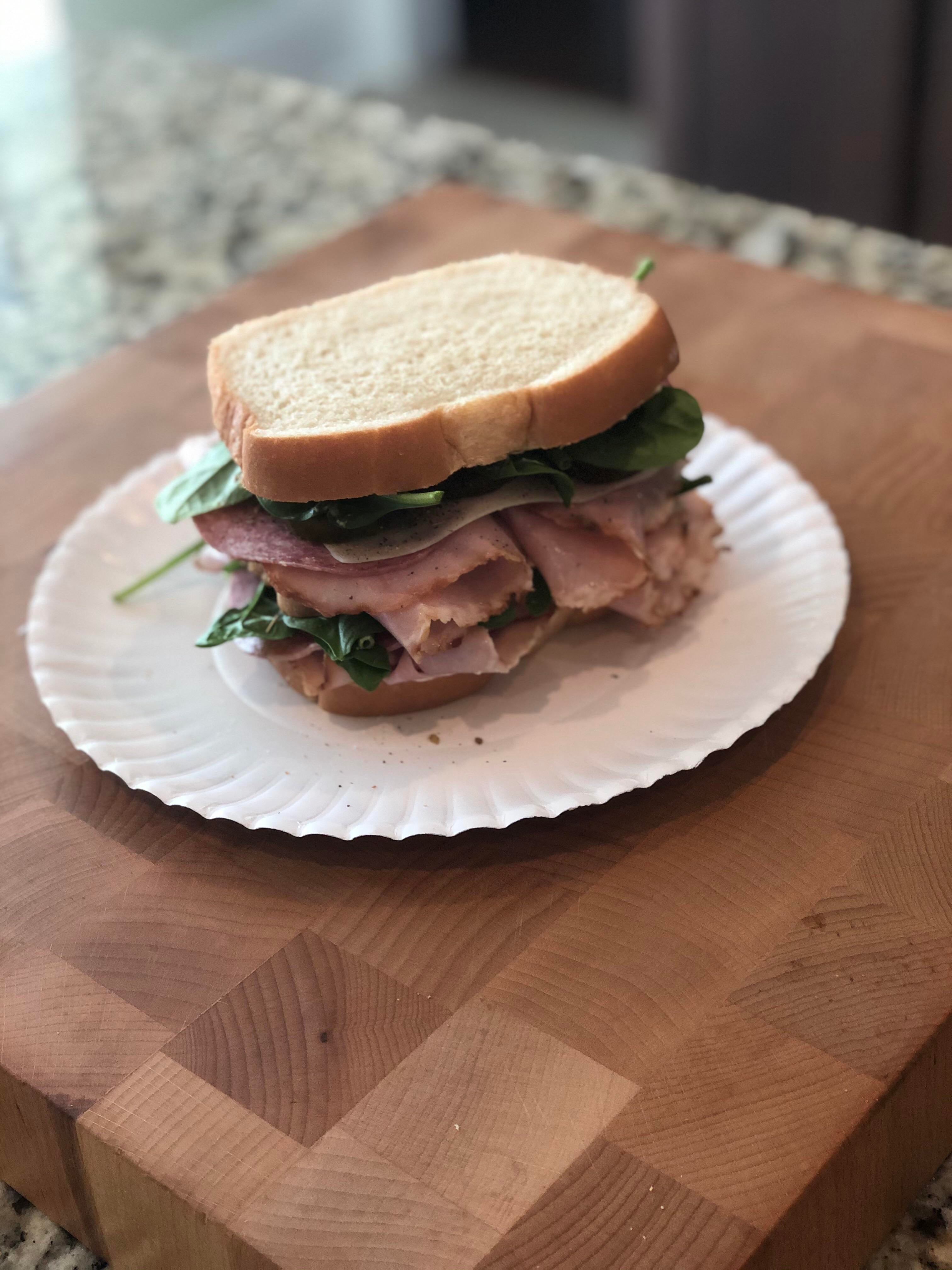 Homemade triple decker ham Sammy. Maple ham, Swiss, salami, mayo, Dijon ...