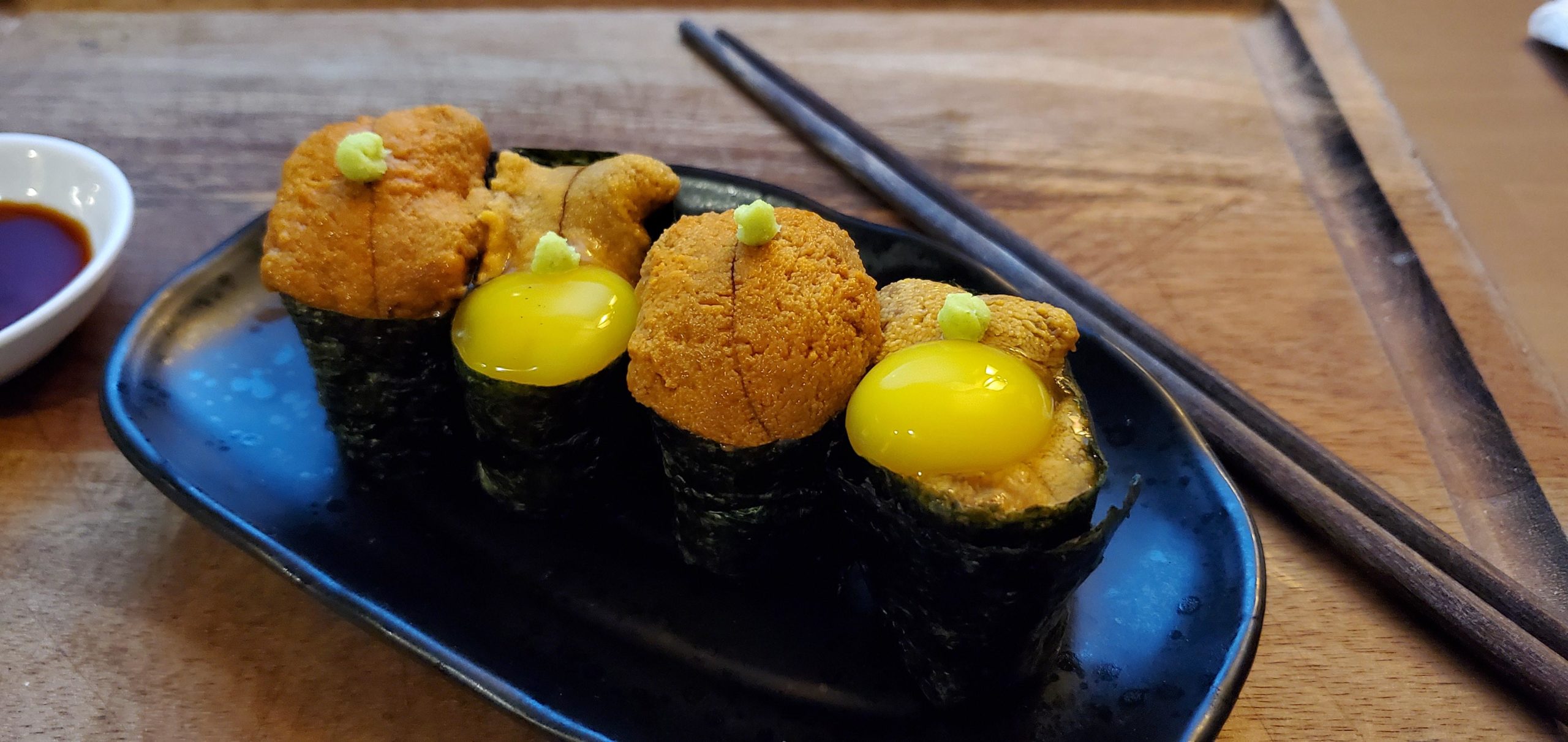 Made a little pre-dinner snack. Uni gunkan, 2 topped with quail egg 😋 ...
