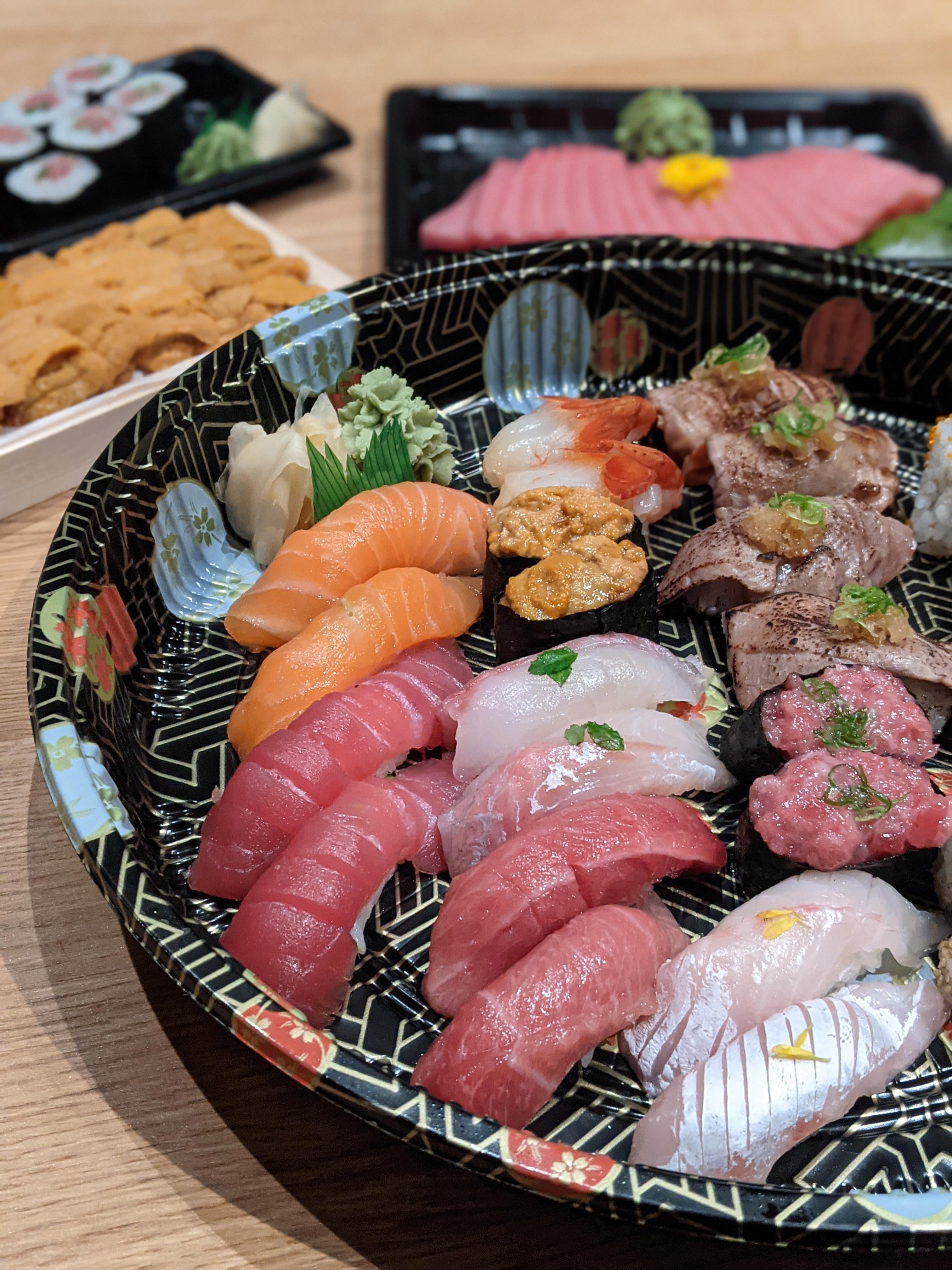 Nirigi, negitoro maki, uni, chutoro sashimi and assorted rolls for ...