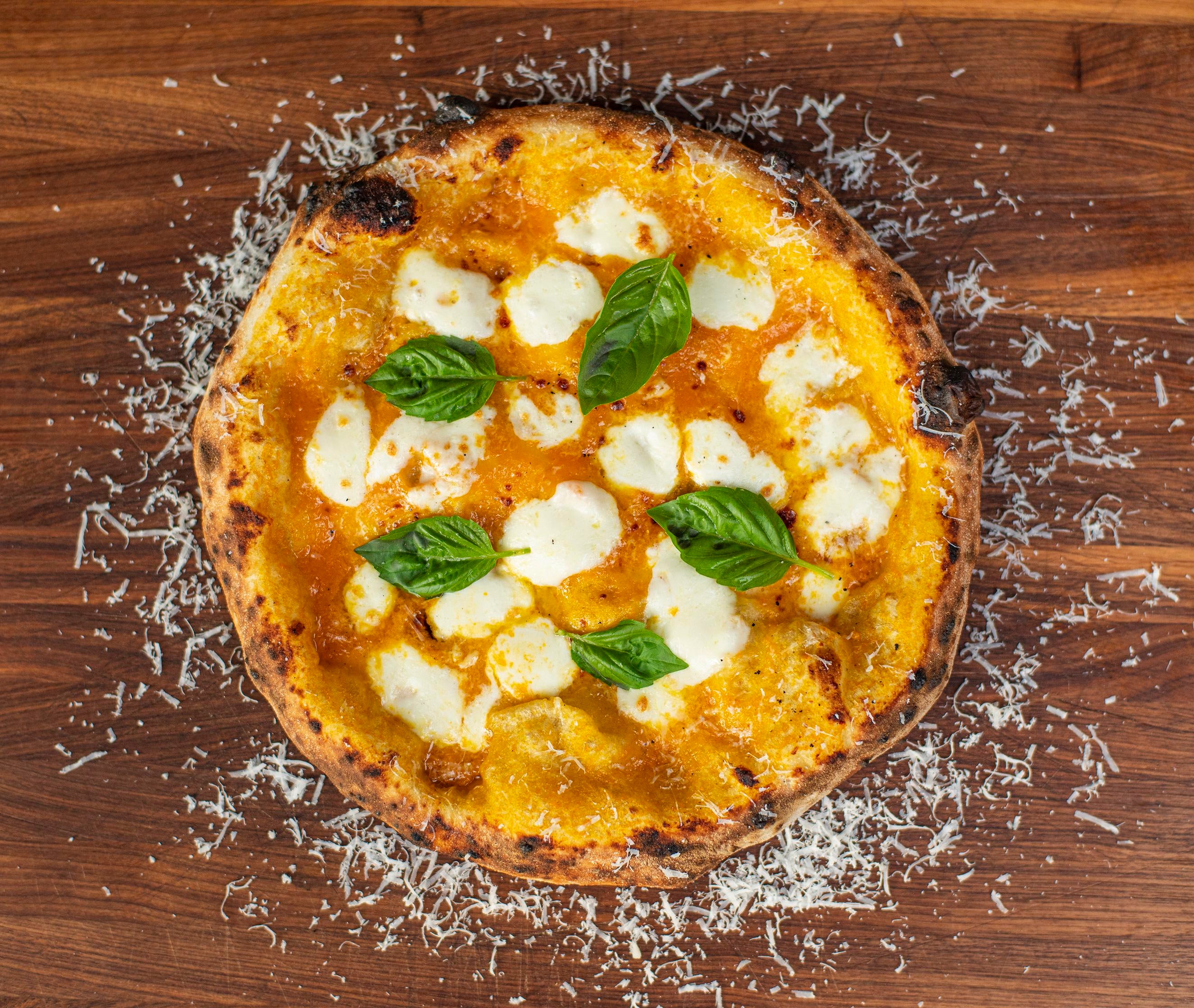 Pure gold! Margherita pizza with a sauce of homegrown sun gold tomatoes ...
