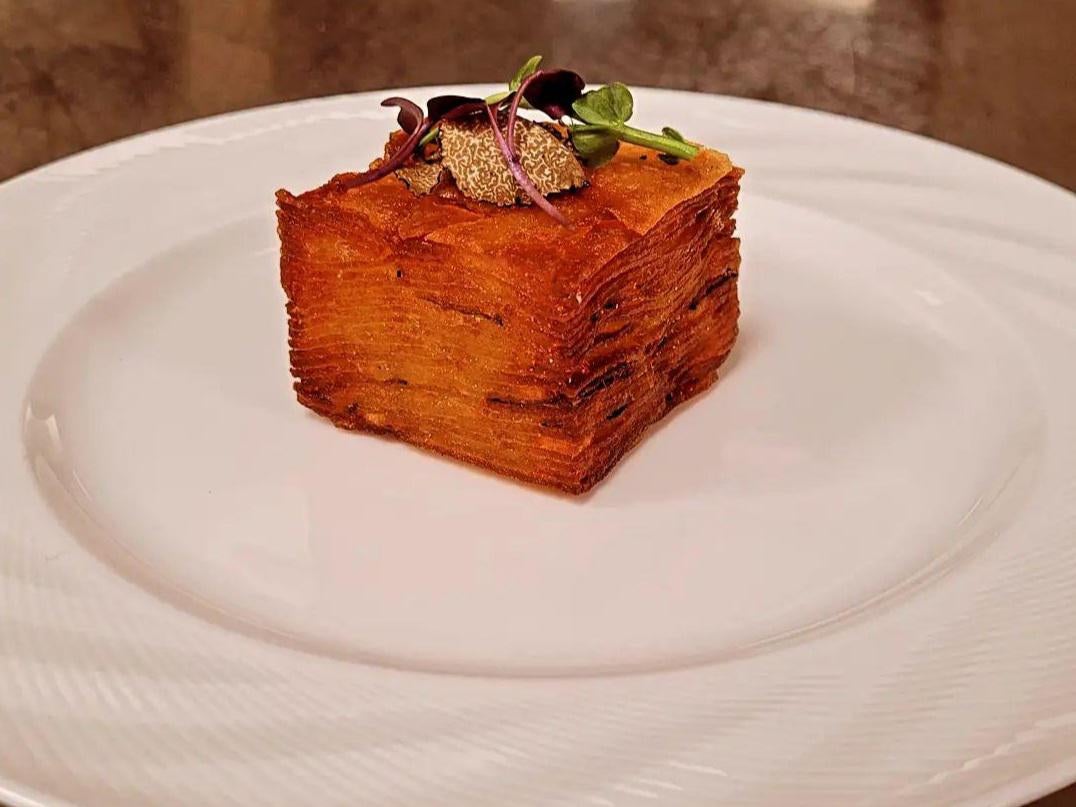 Potato mille-feuille with fresh truffle and garlic confites - Dining ...