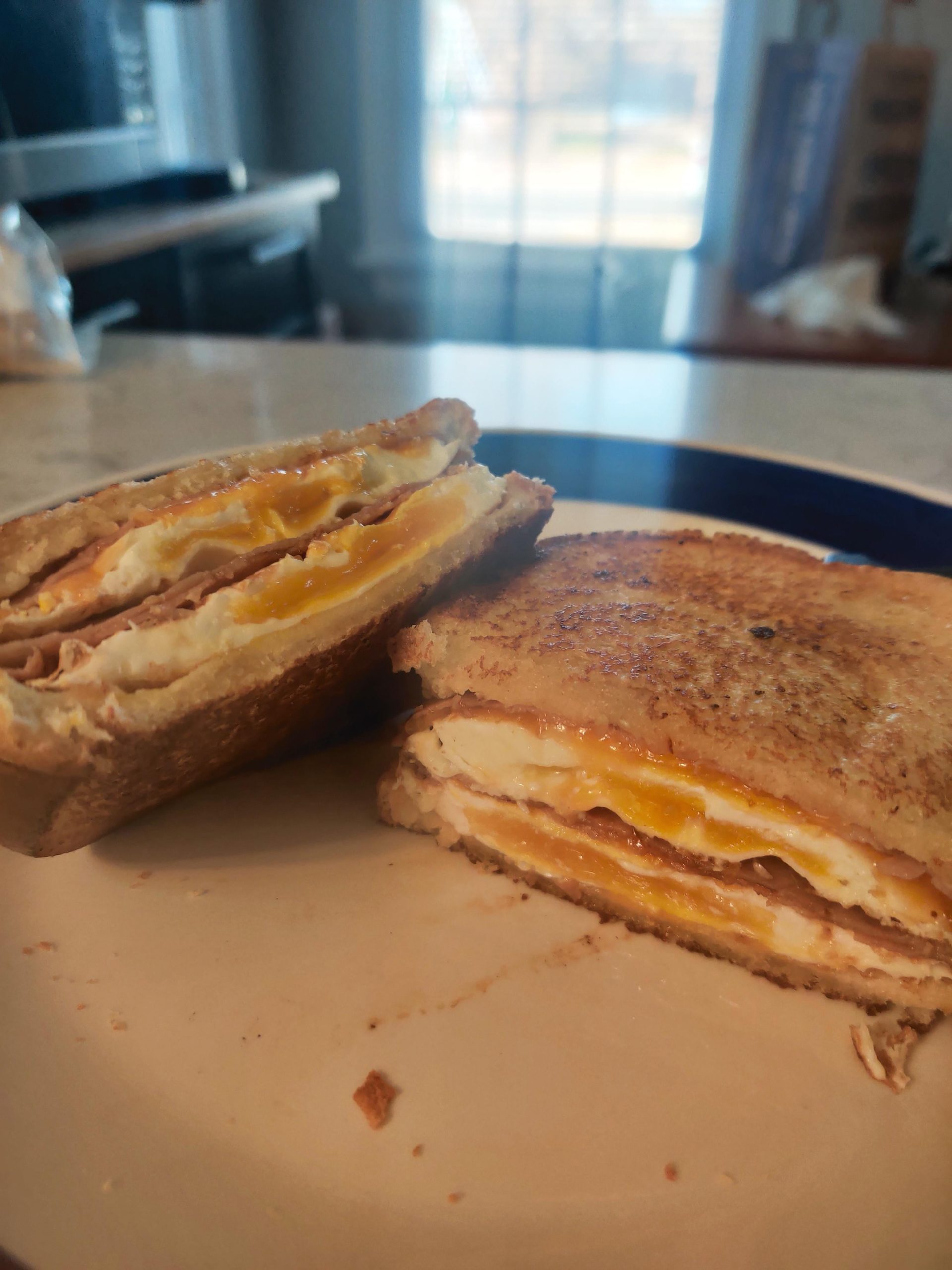 Just a quick egg, ham, and cheese breakfast sandwich. - Dining and Cooking