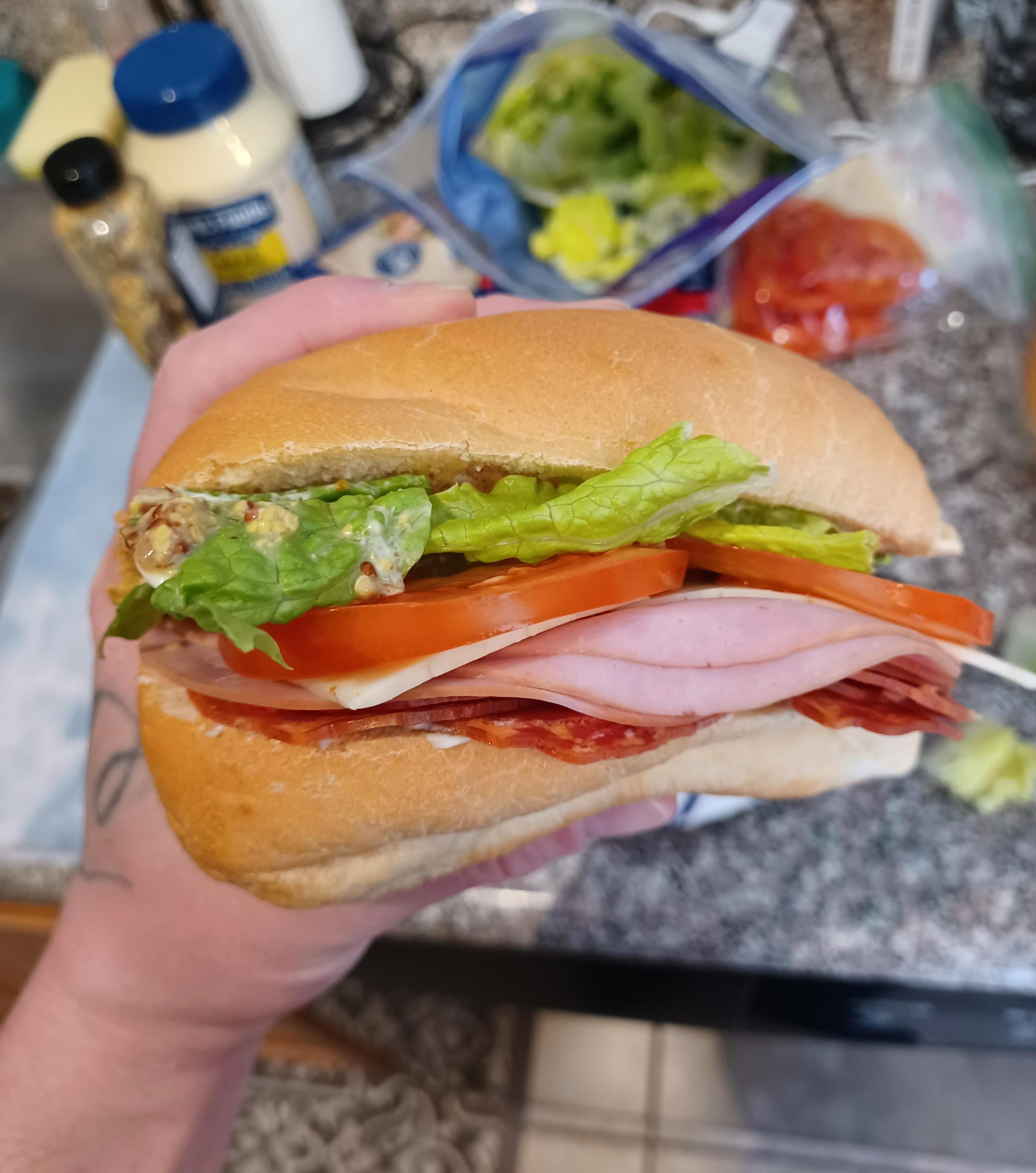 Homemade Italian style. Pepperoni, ham, ghost pepper-jack, tomato ...