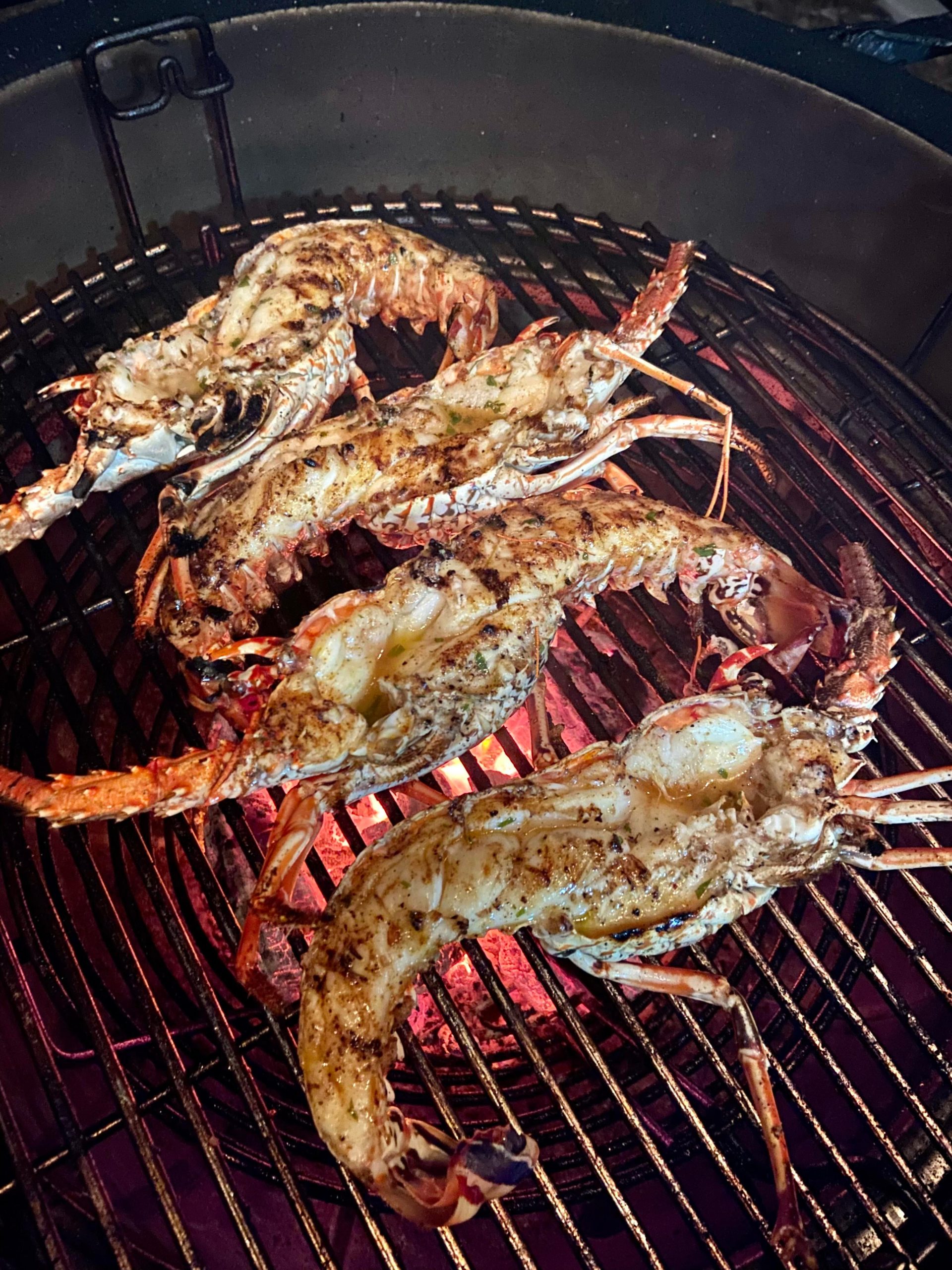 Freshly caught spiny lobsters basted in garlic lime butter - Dining and ...