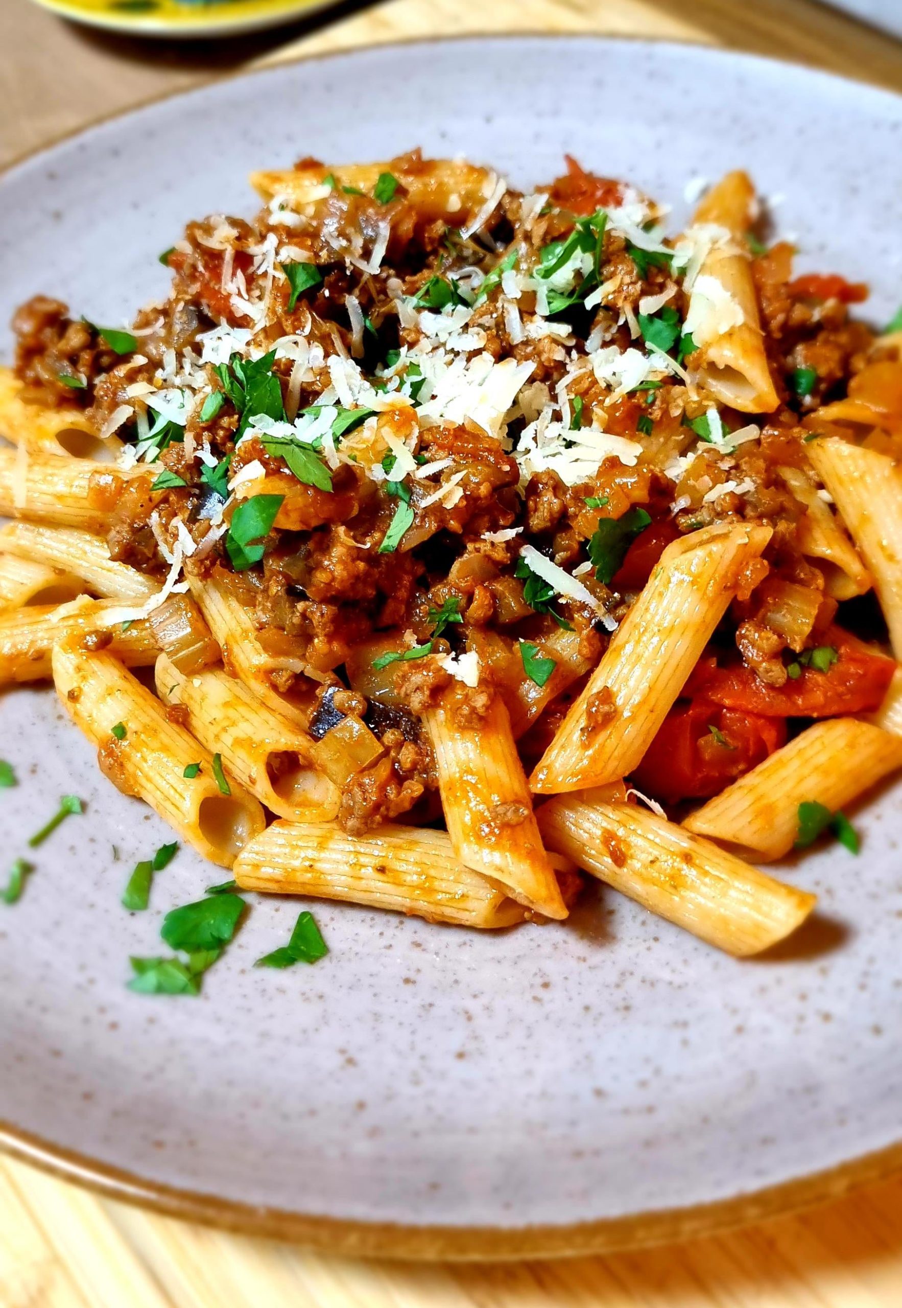 Penne al ragù with roasted tomatoes - Dining and Cooking
