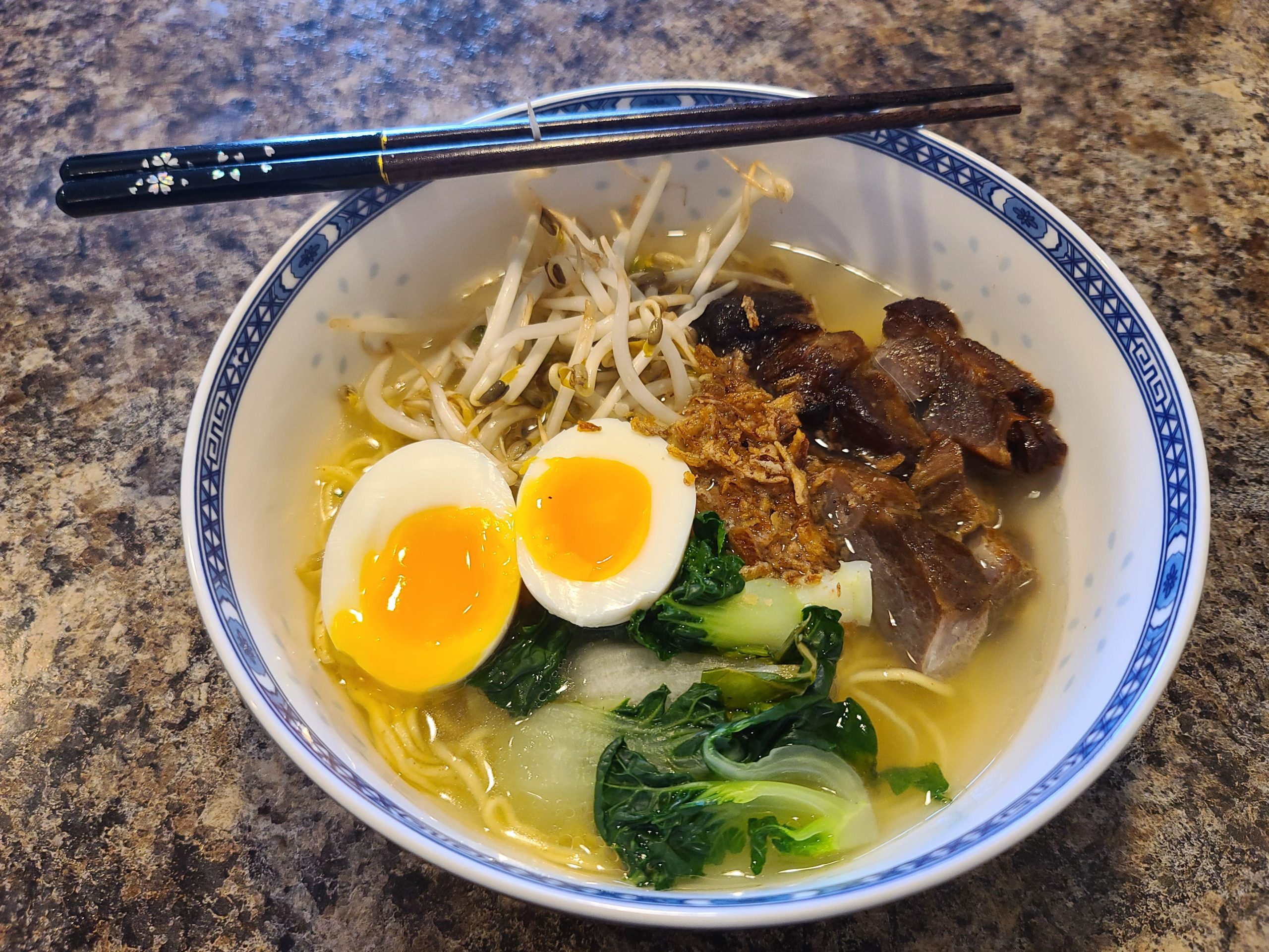 Nissin Raoh Yuzu Shio topped with half boiled egg, sprouts, bok choy ...