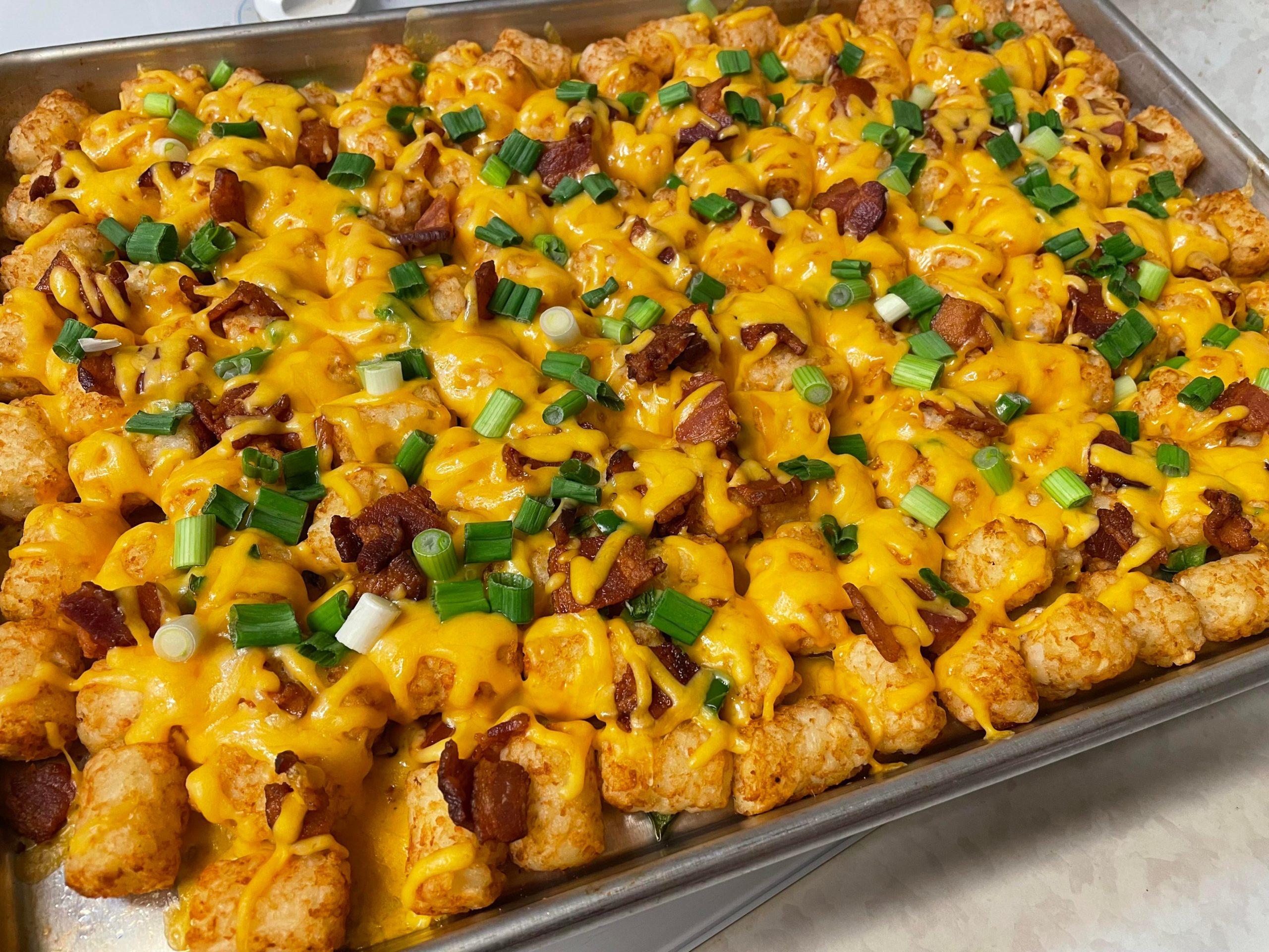 Loaded tots! Tots, jalapenos, bacon, green onion, shredded cheddar ...