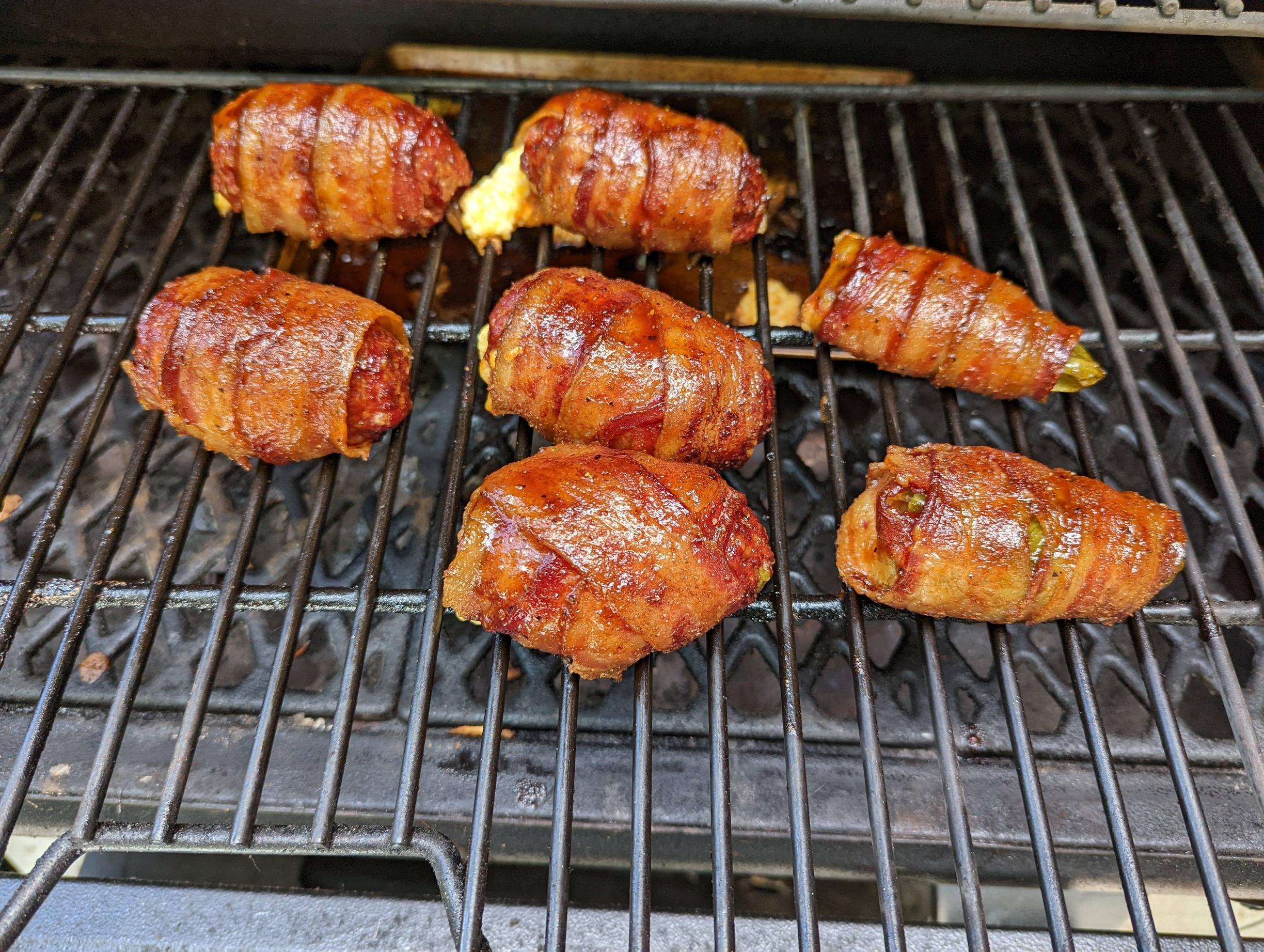Armadillo eggs! Cheddar and cream cheese stuffed jalapenos wrapped in ...