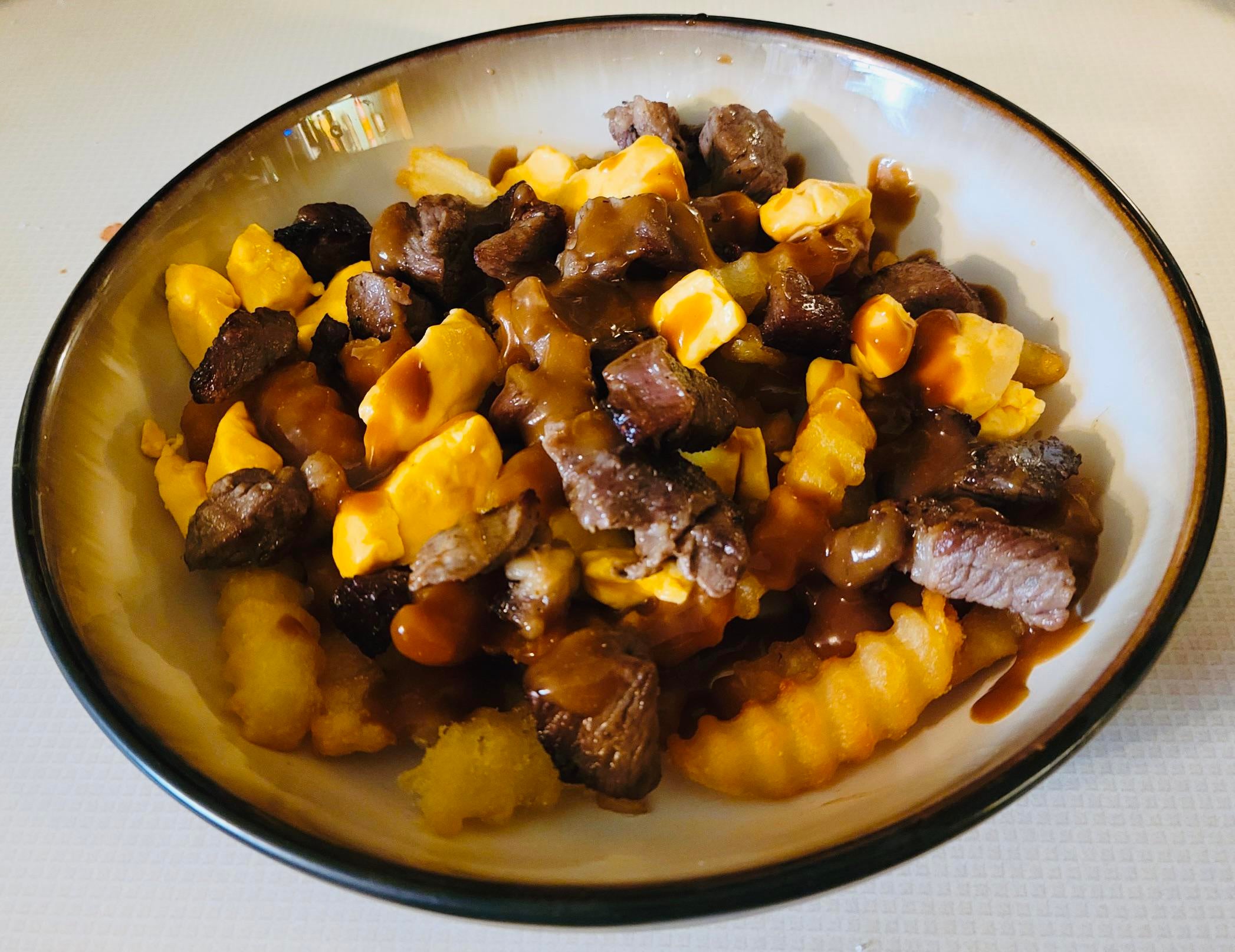 Poutine made with ribeye steak - Dining and Cooking