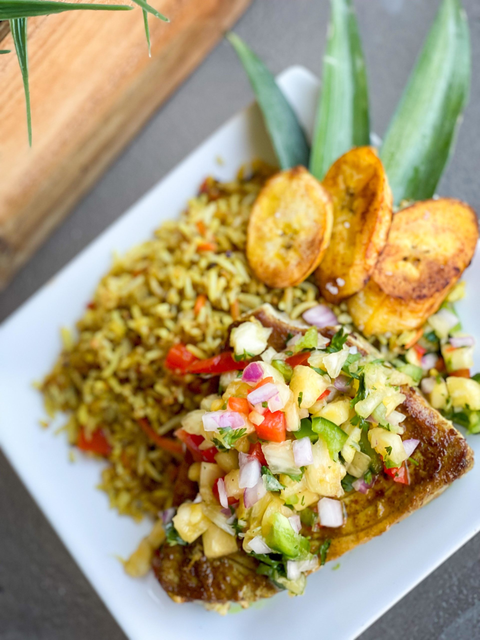 Seared ahi with pineapple salsa, curried rice, and fried plantains ...