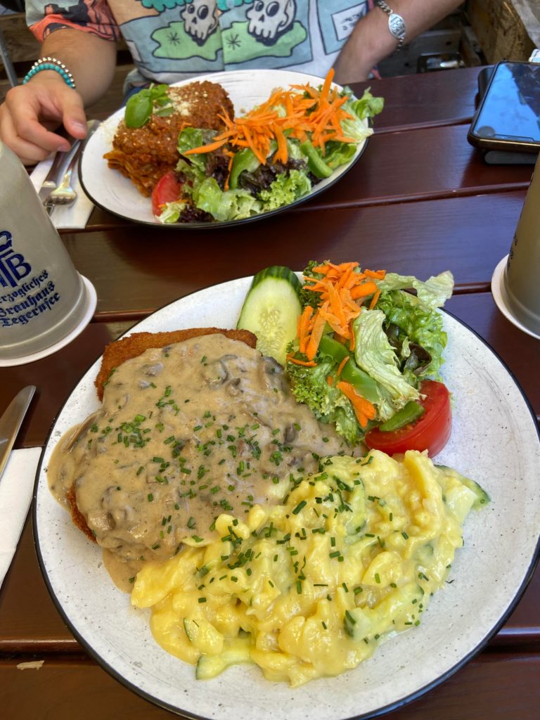 Vegan schnitzel with mushroom sauce, potato salad, and lasagna at ...