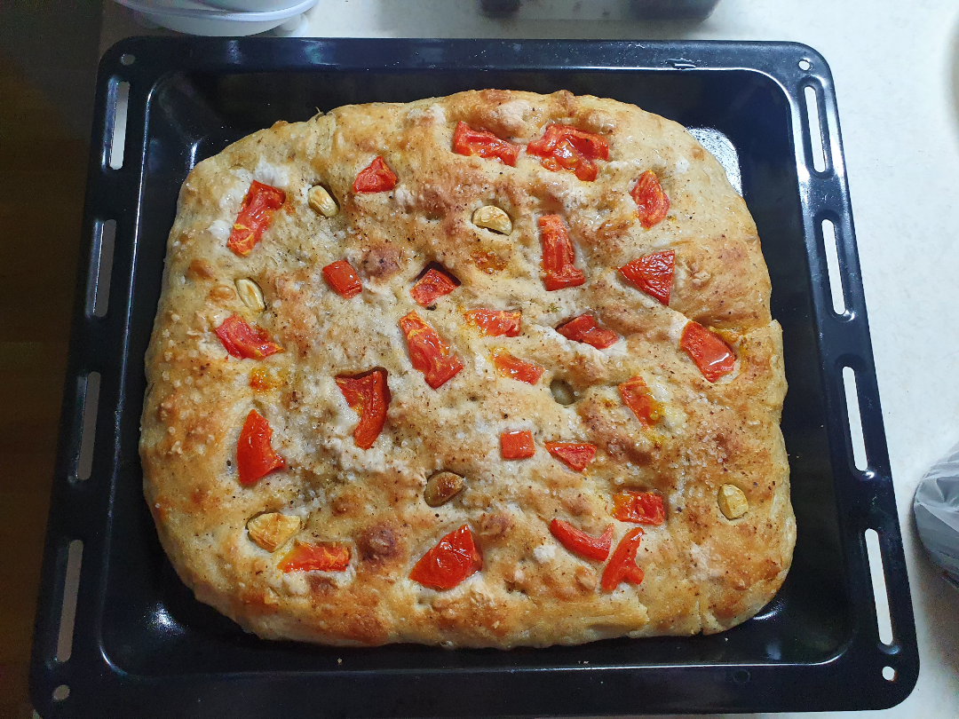 Yesterday's Focaccia. Crumb pic on the second slide. As always any ...