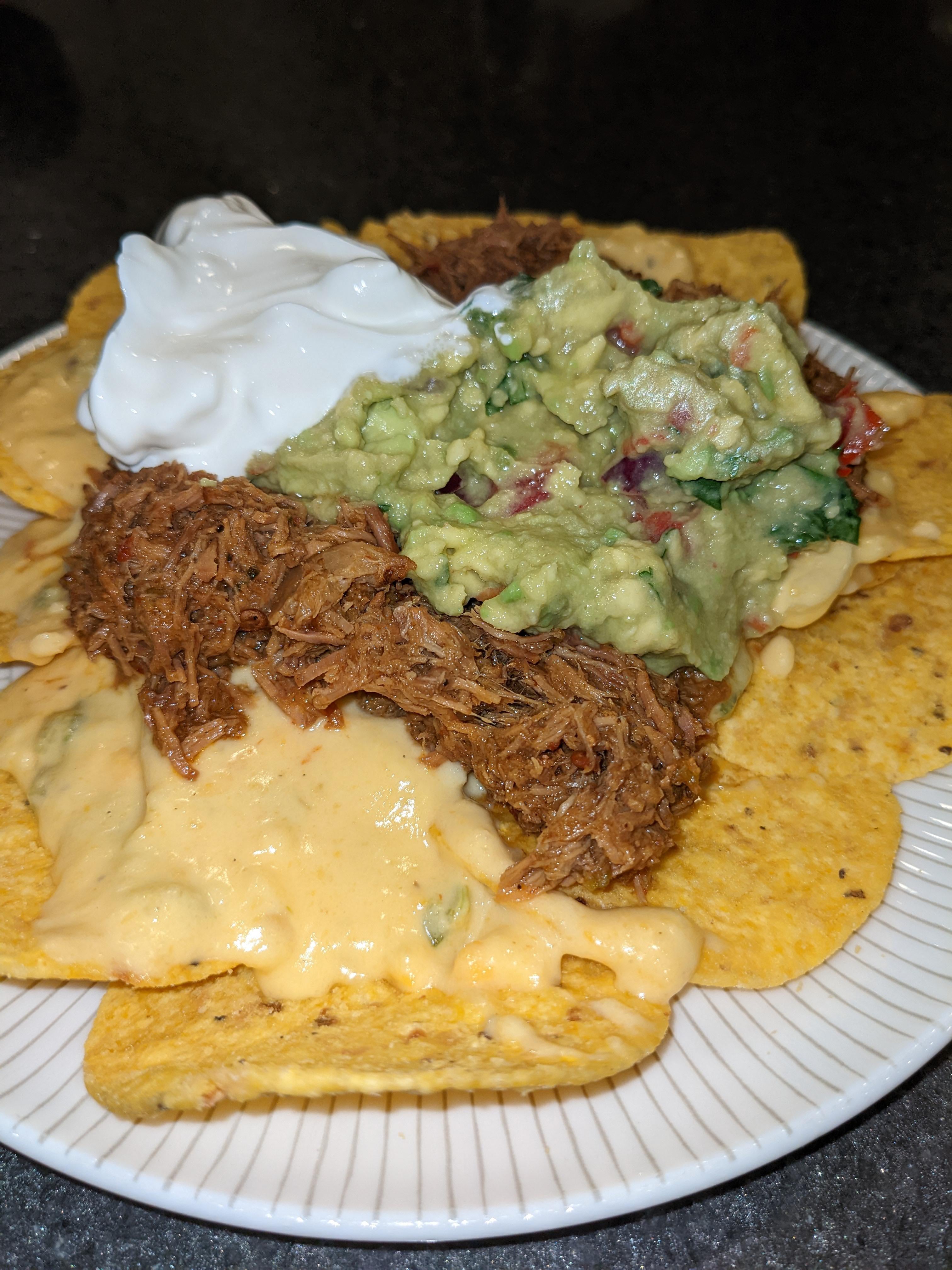 [Homemade] Shredded beef nachos with homemade guac and queso. - Dining ...