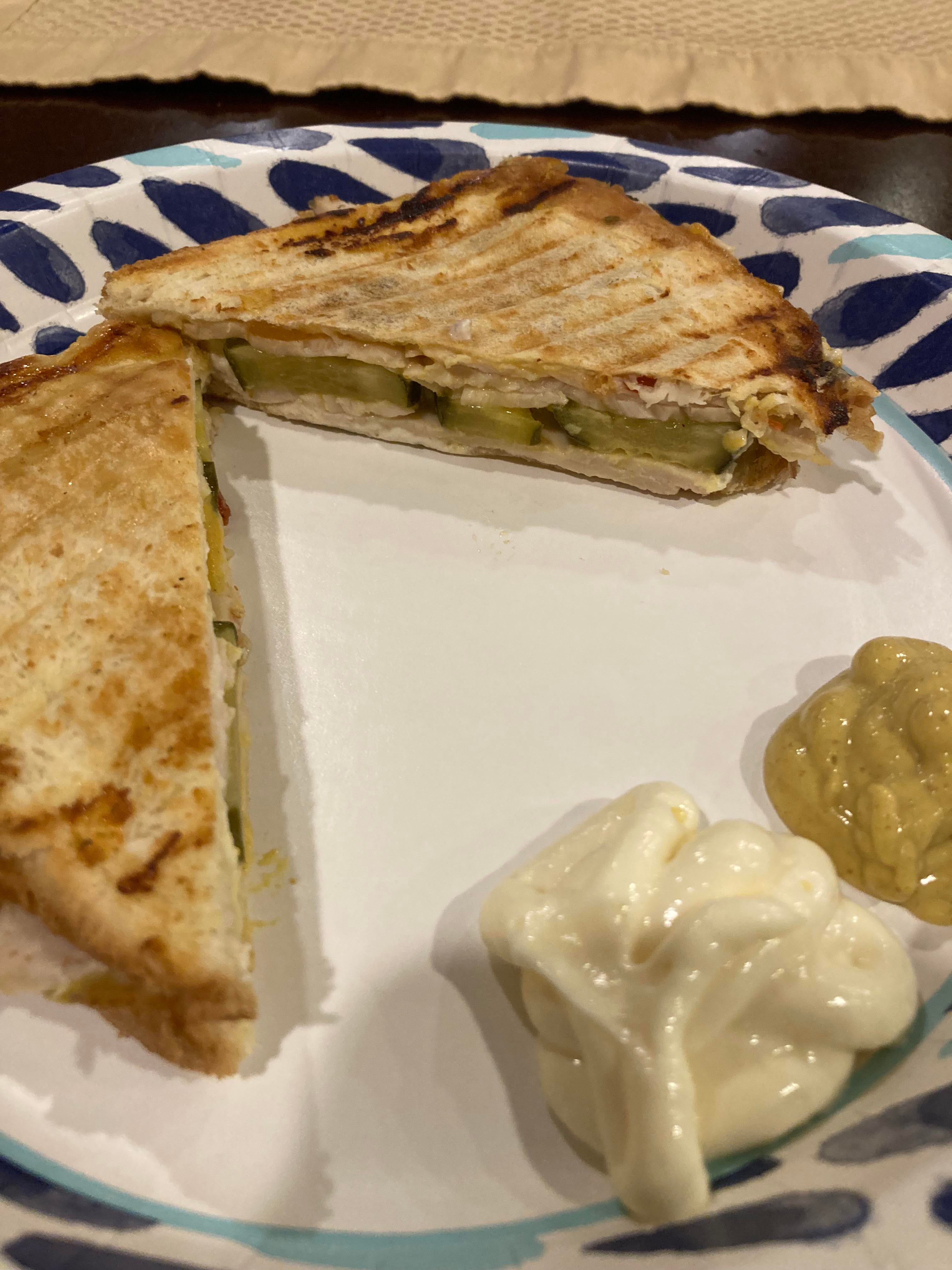 Panini with smoked turkey. Borsain chive and garlic cheese Mano chutney ...