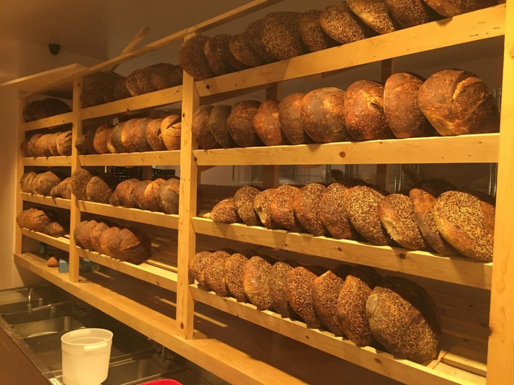 All ready for tomorrow’s crowd. 200+ sourdough loafs a day, we sell out ...