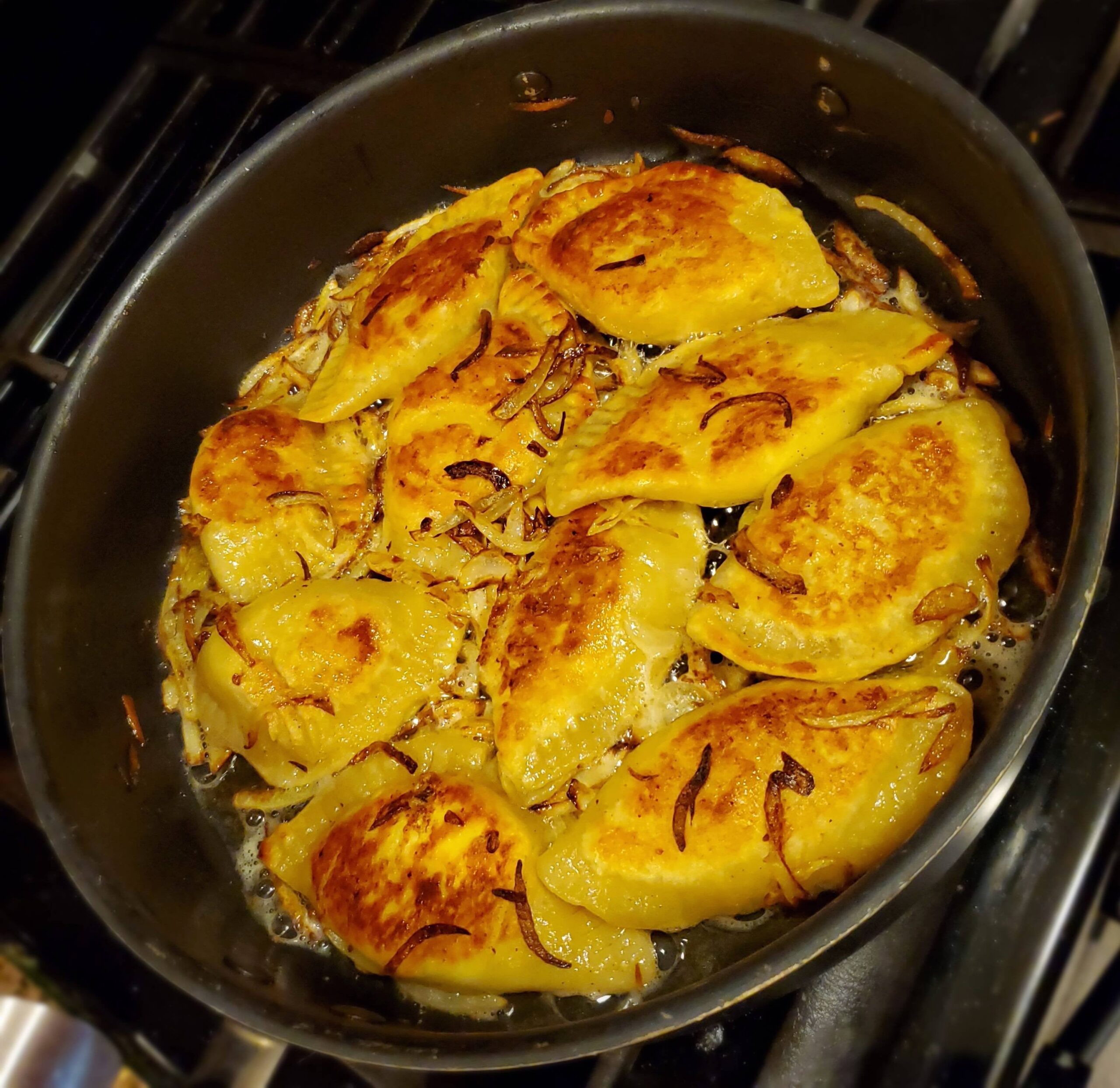 Homemade pierogis 3-ways: Kraut, potato and cheddar, and jalapeño cream ...