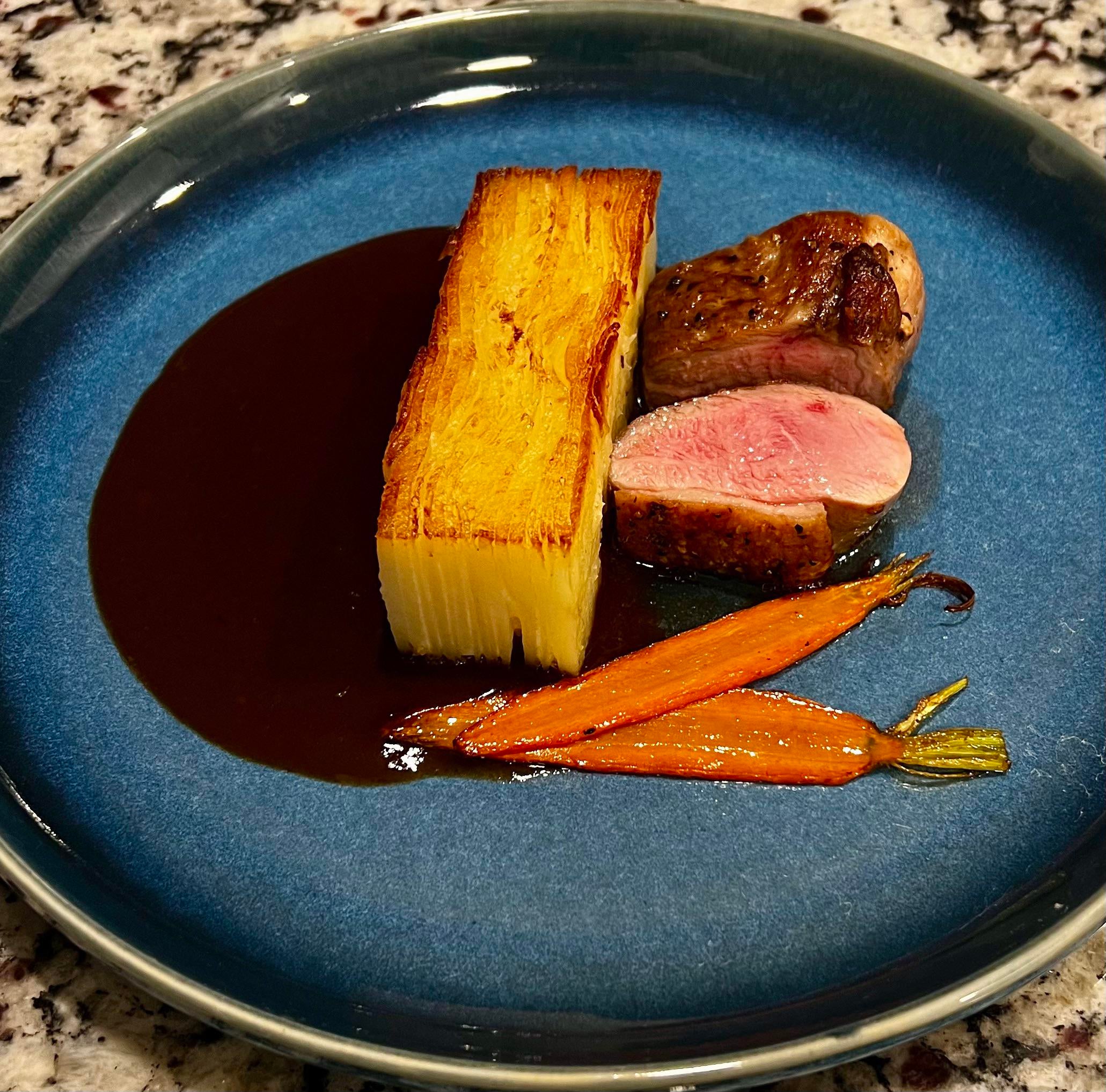 Last cook of the year. Duck breast, potato pave, carrot cross sections ...