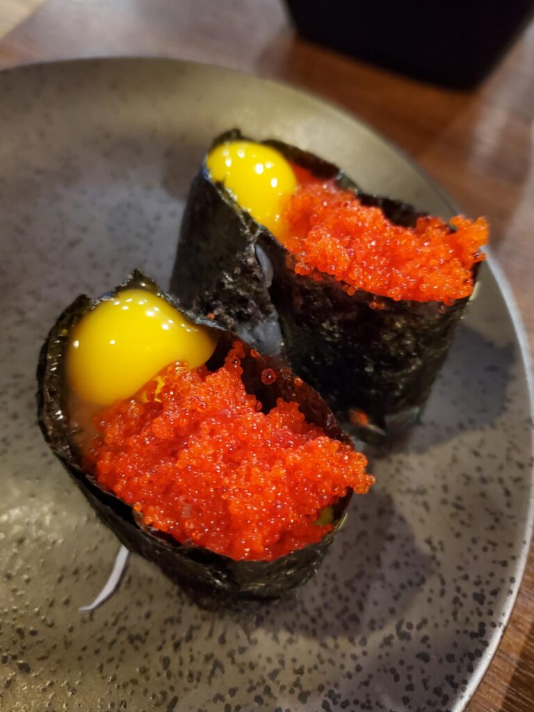 Quail egg and tobiko nigiri......or maybe roll.....well, it was on the ...
