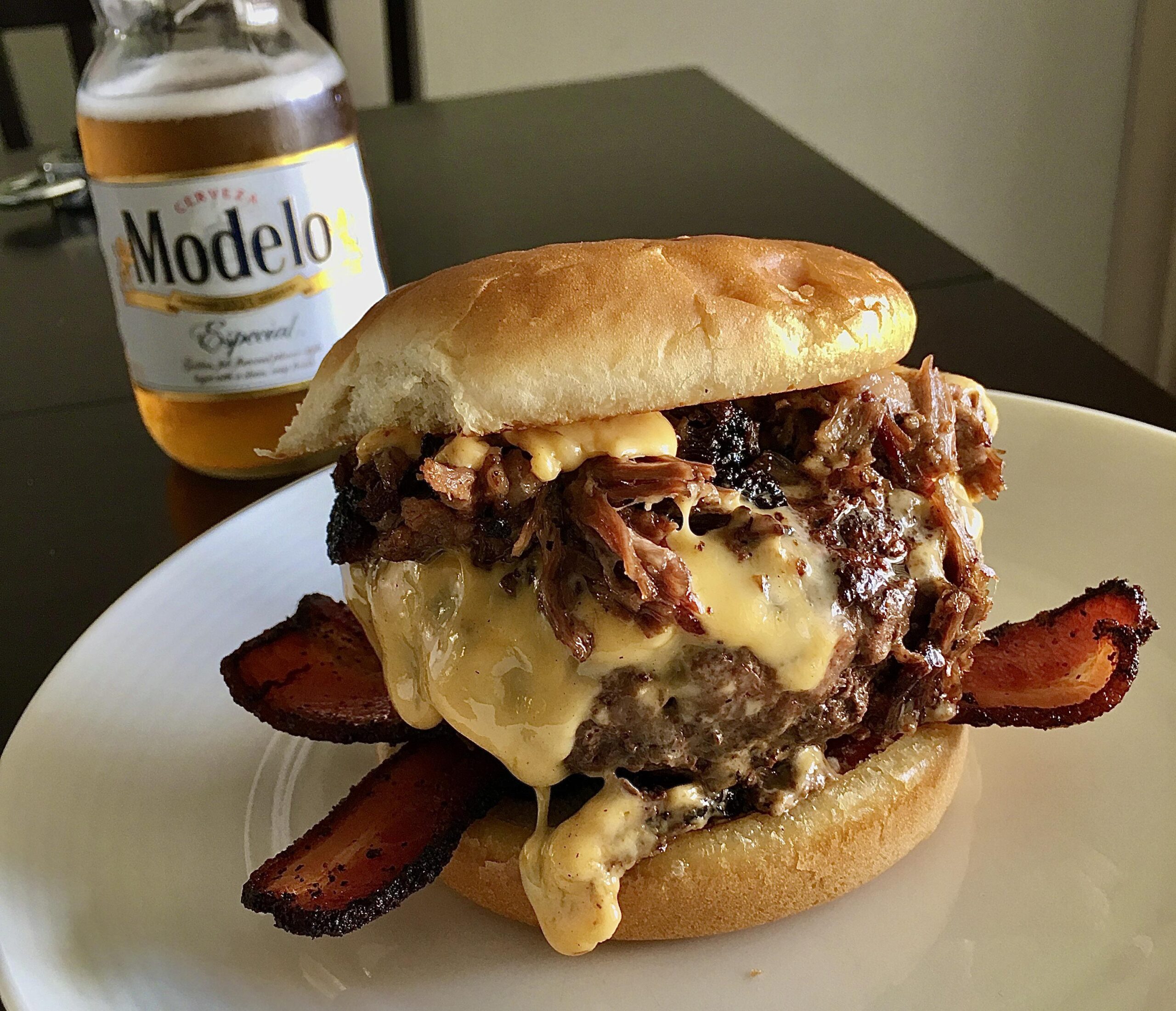 Brisket, bacon, 60/40 beef, American cheese, potato roll. - Dining and ...
