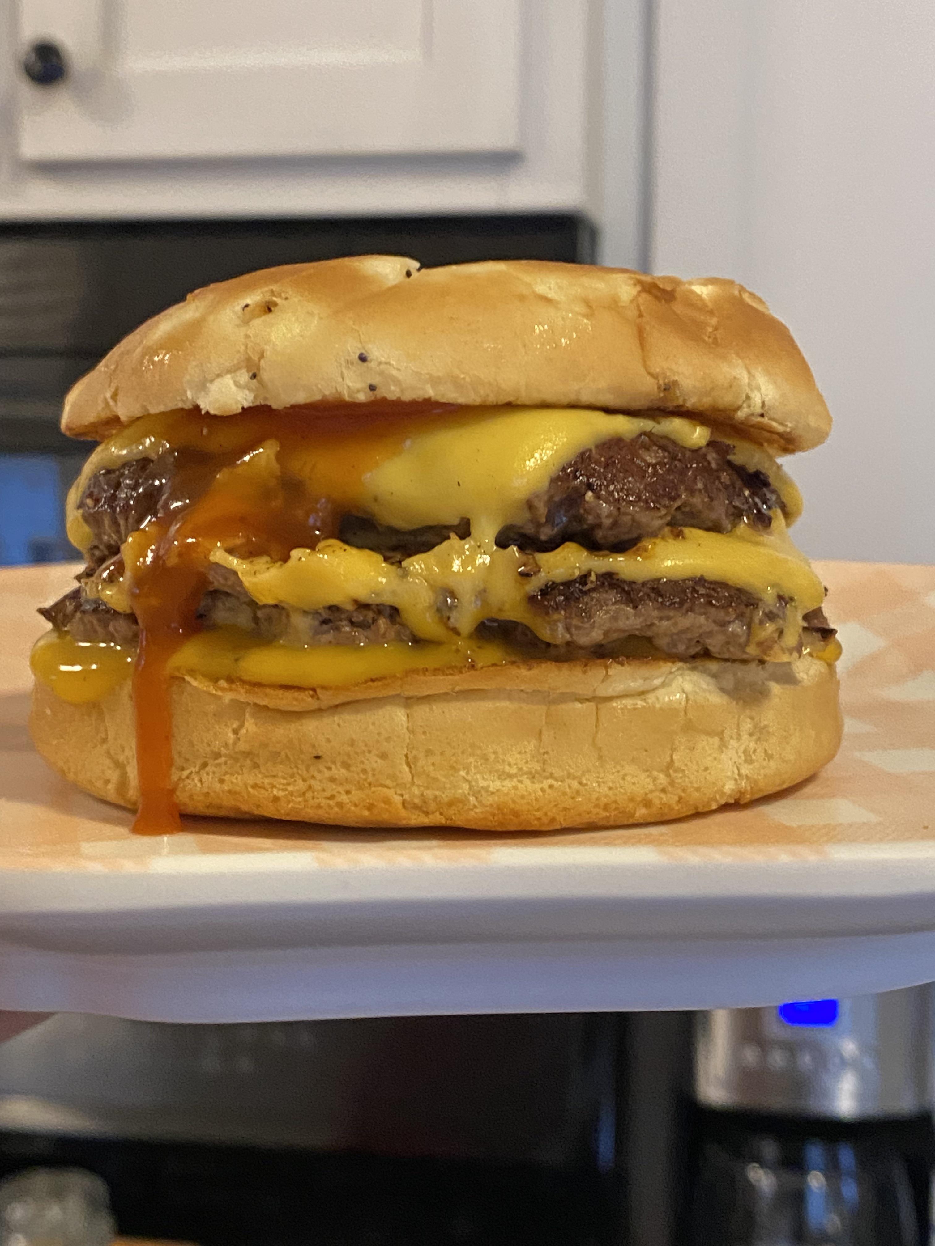 Beef n Cheddar double cheeseburger on an onion roll. My homage to Arbys ...