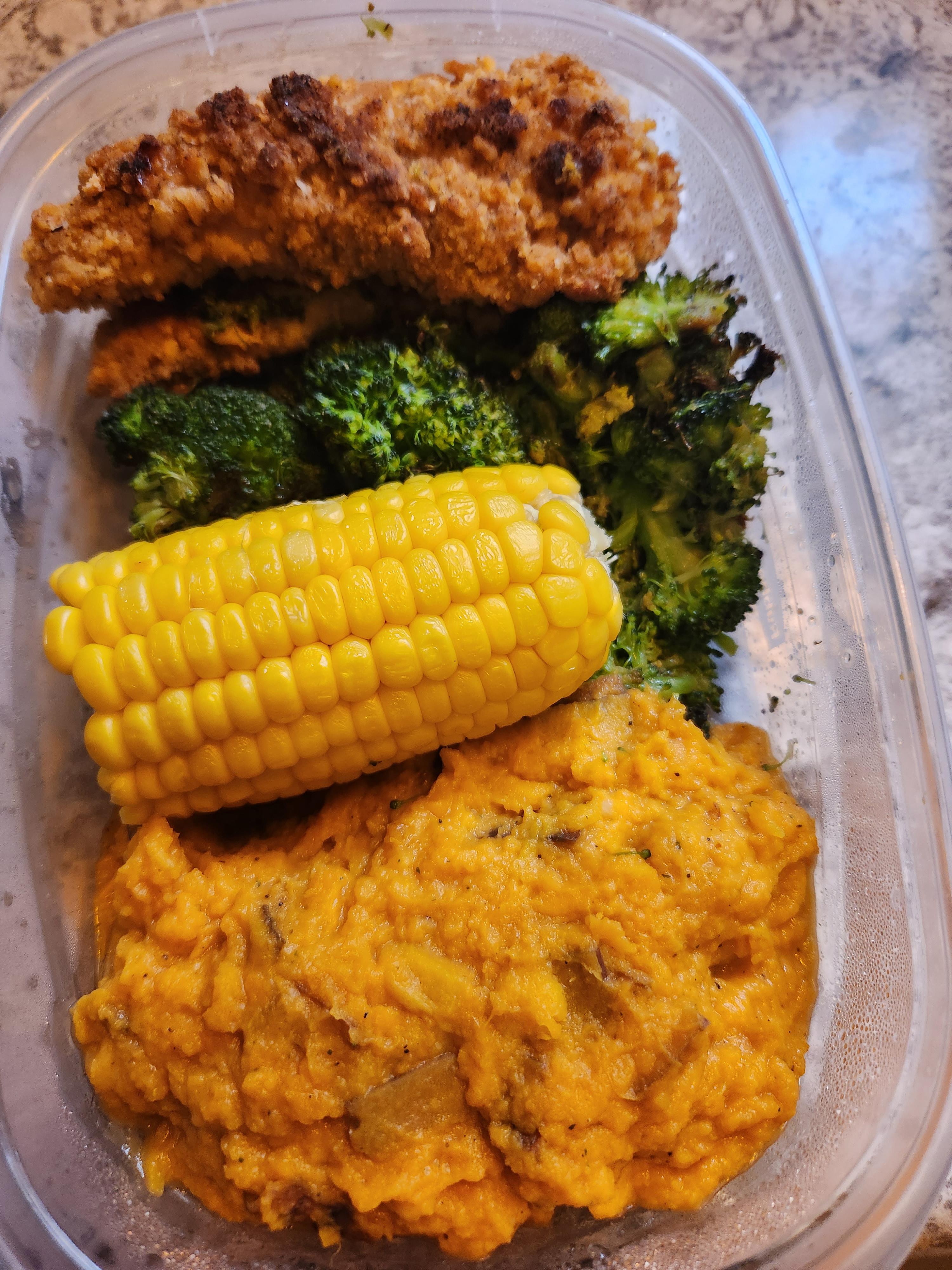 A little taste of home. Oven fried chicken, broccoli, corn on the cob ...