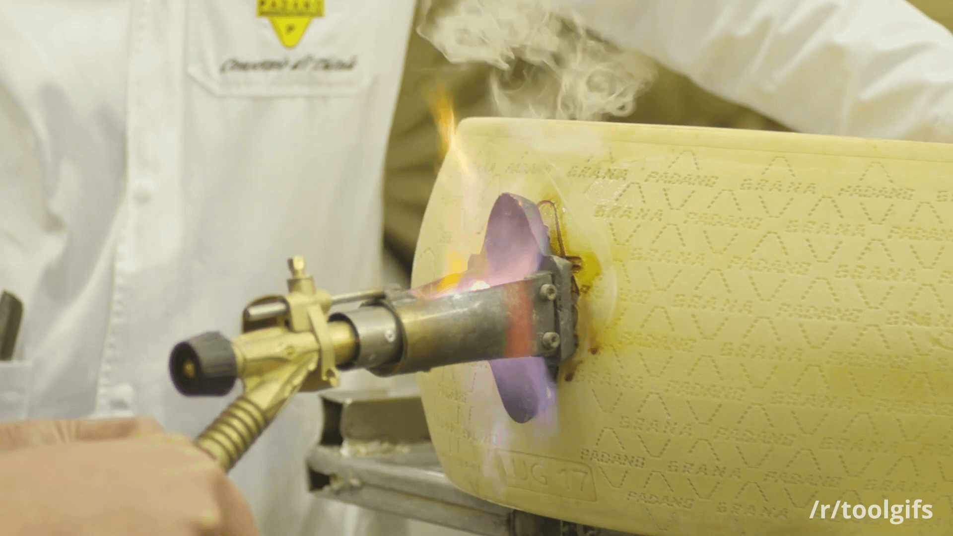 Fire-branding a wheel of cheese - Dining and Cooking