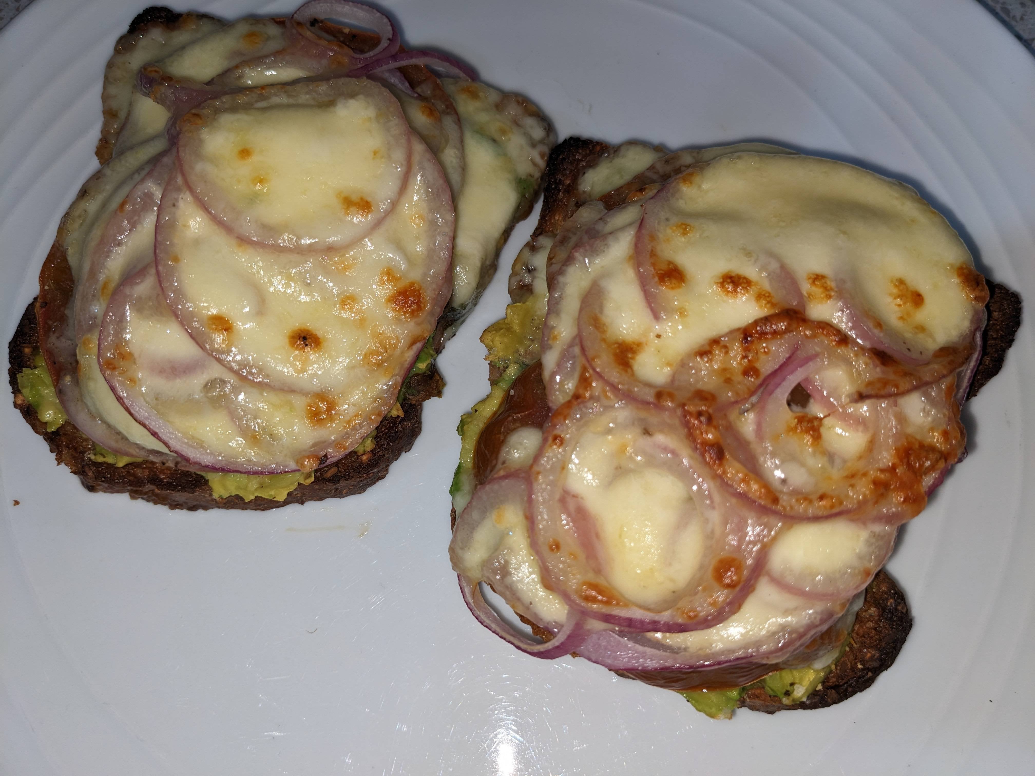 Open faced grilled heirloom tomato, avocado, Spanish onion and ...